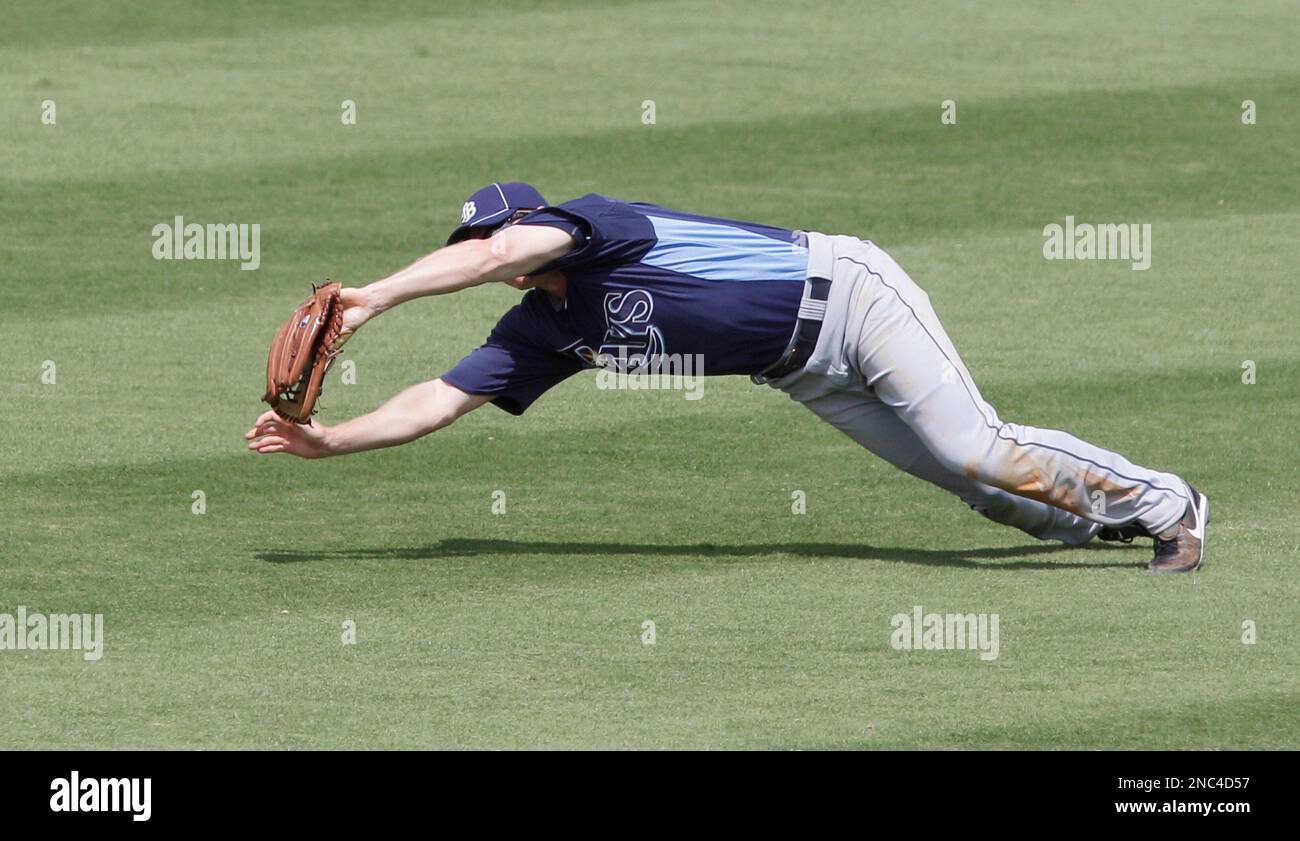 Tampa Bay Rays Sam Fuld makes a diving catch during the fifth inning of ...