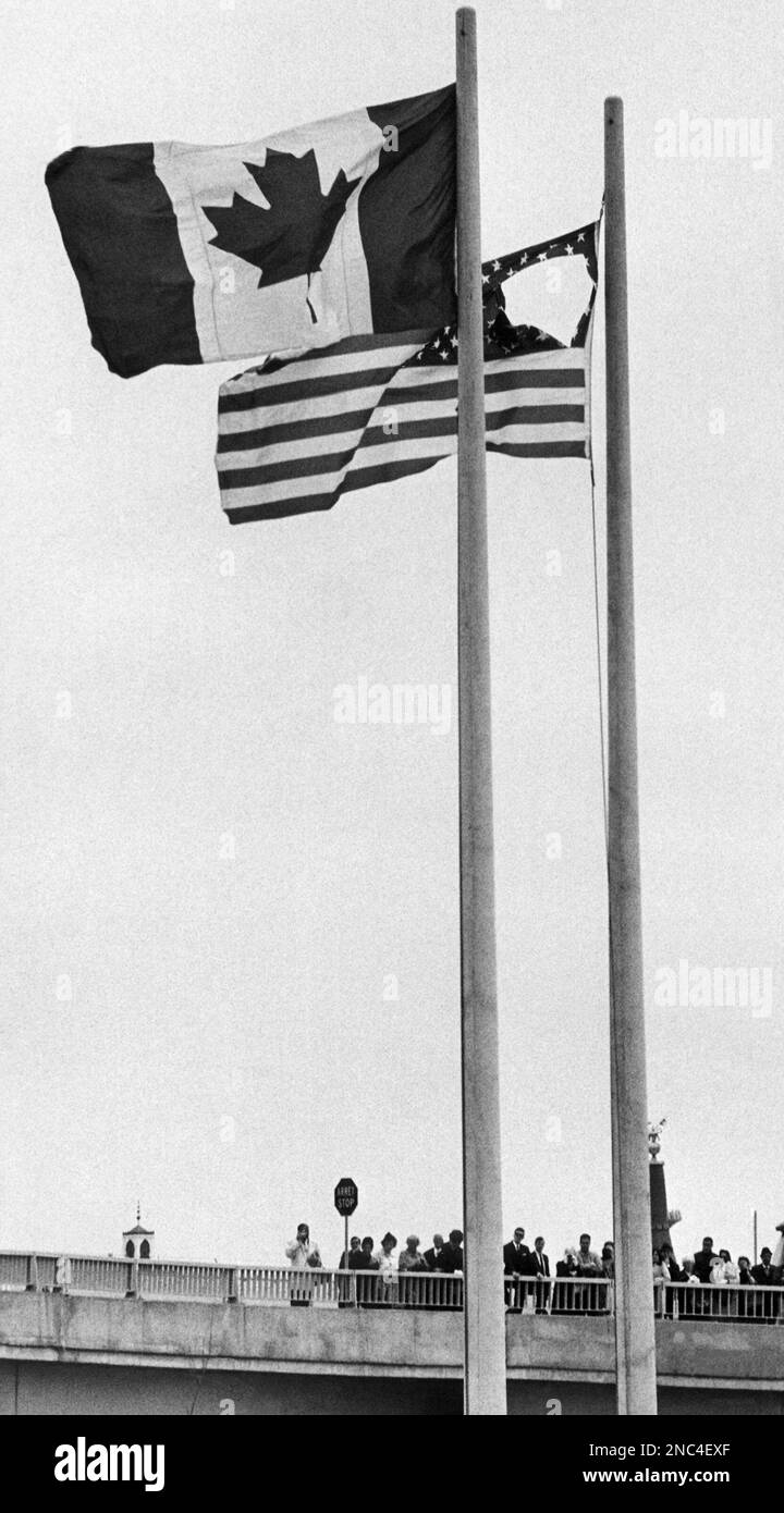 Stars have been ripped from a United States flag as it flies beside ...