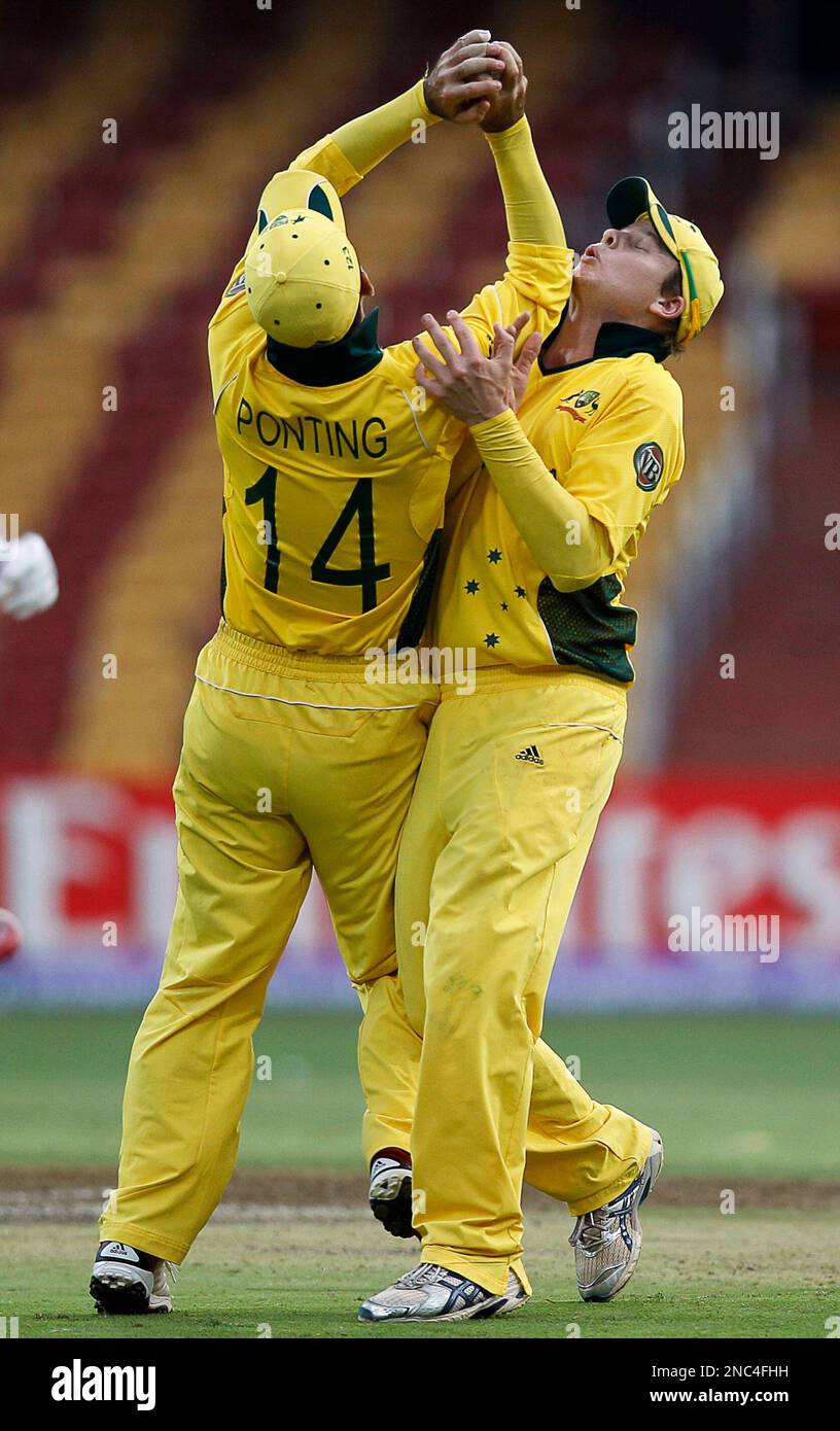 Australia's captain Ricky Ponting, left, collides with Steve Smith as ...