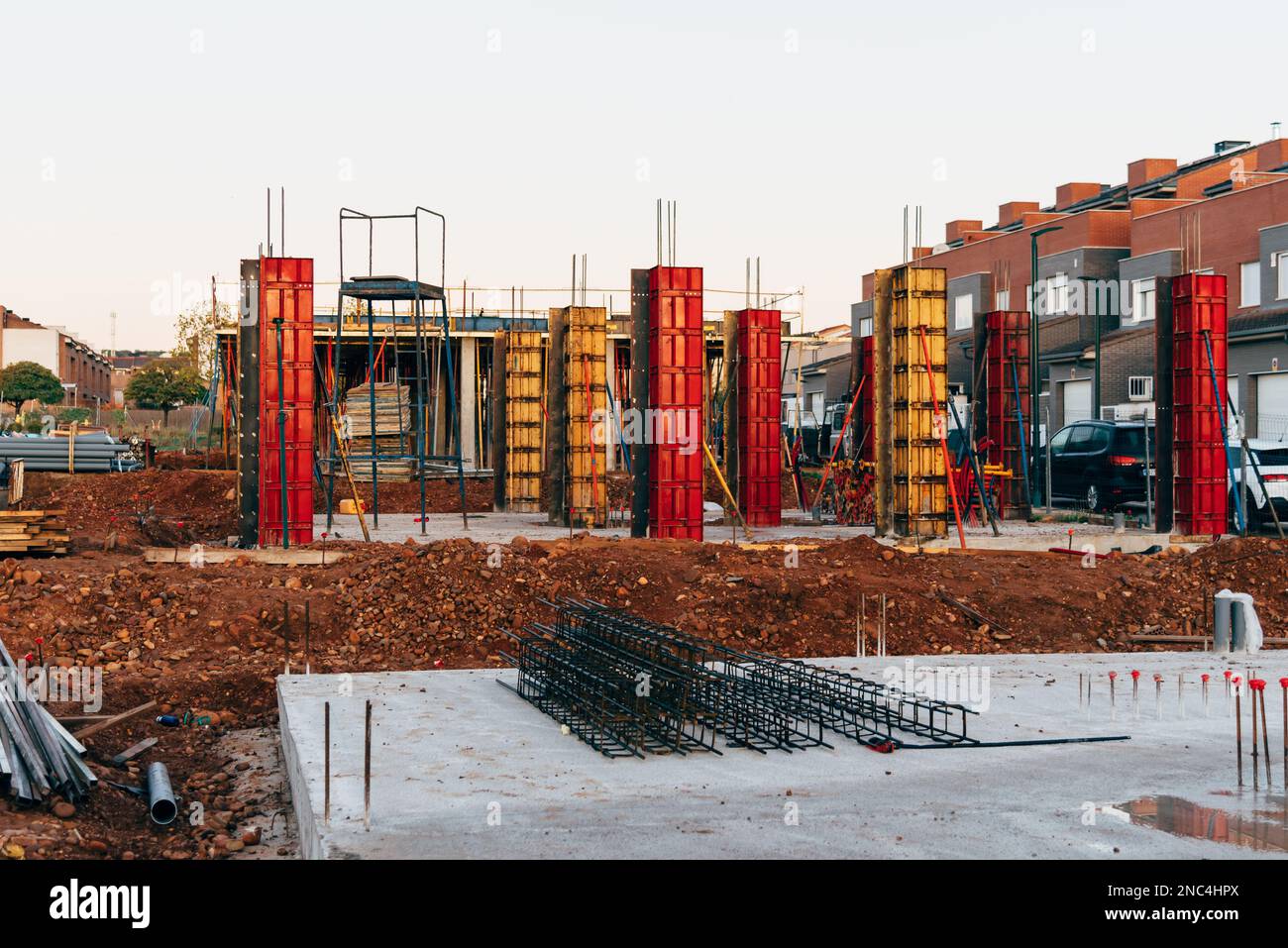 Construction site with steel formworks and reinforcing bars for pillars ...