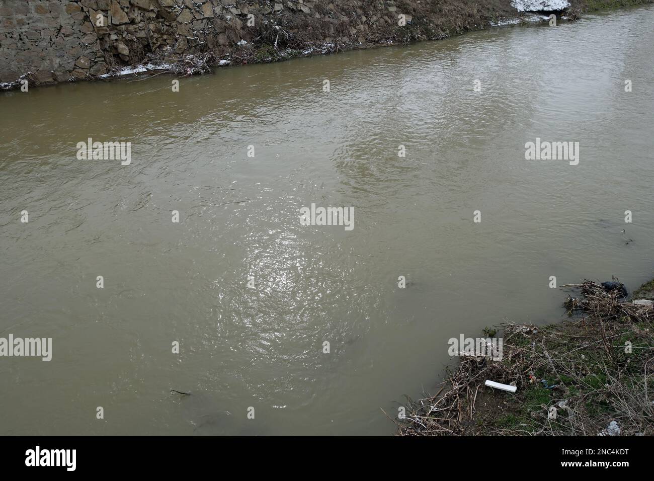 The river whose water is increased by the rain water, the waters of a ...