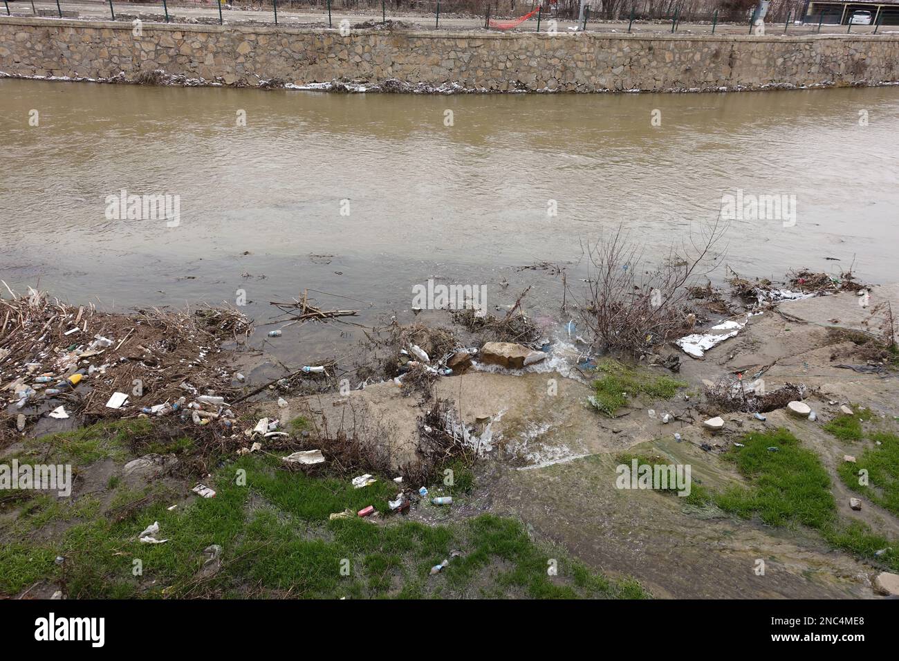 pollution of natural rivers by humans, river polluted by urban waste ...