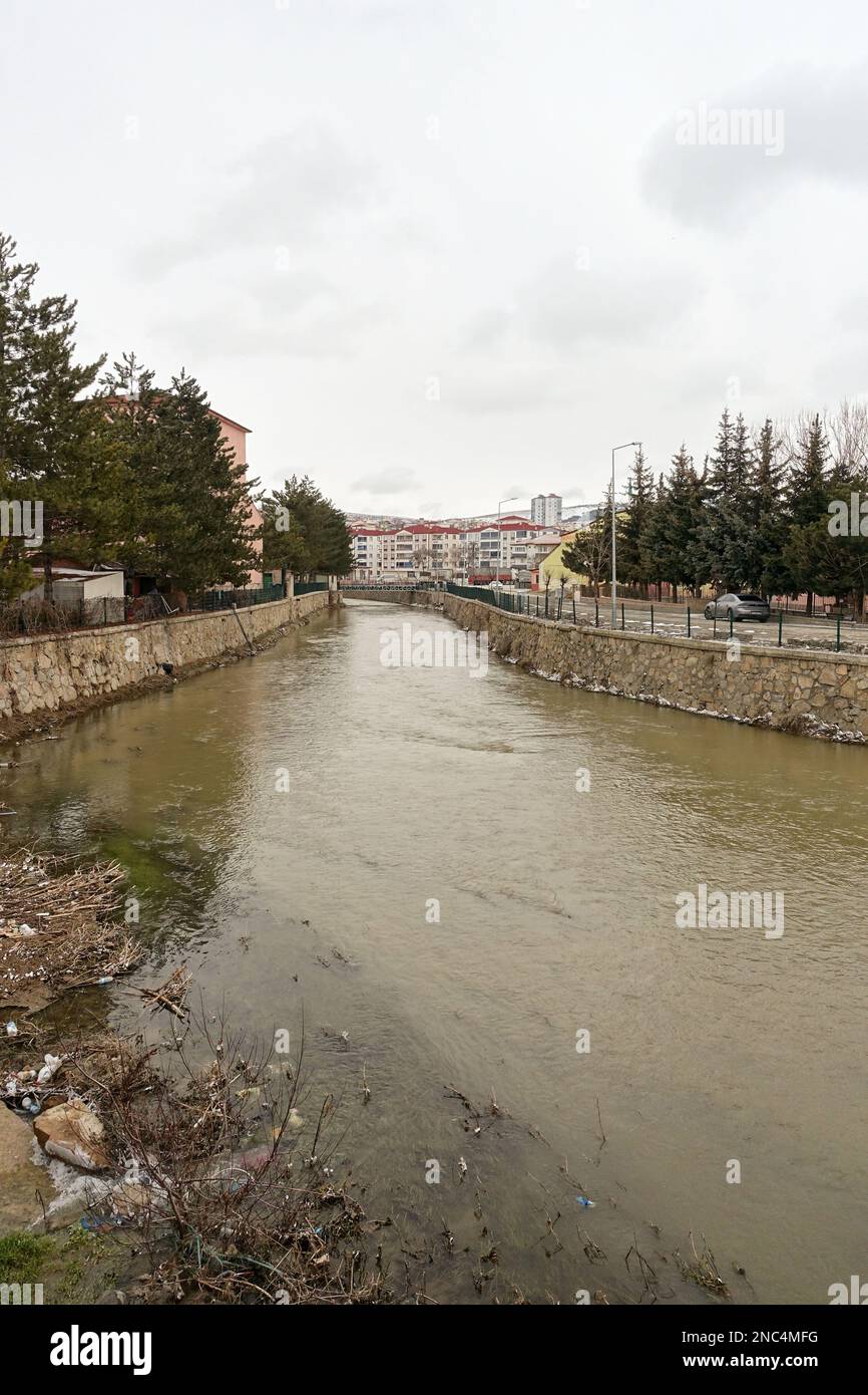 pollution of natural rivers by humans, river polluted by urban waste ...