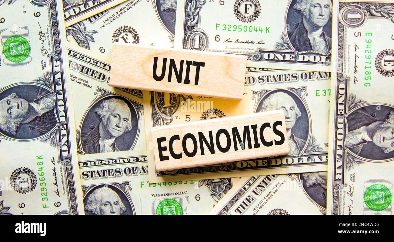 Unit economics symbol. Concept words Unit economics on wooden blocks ...
