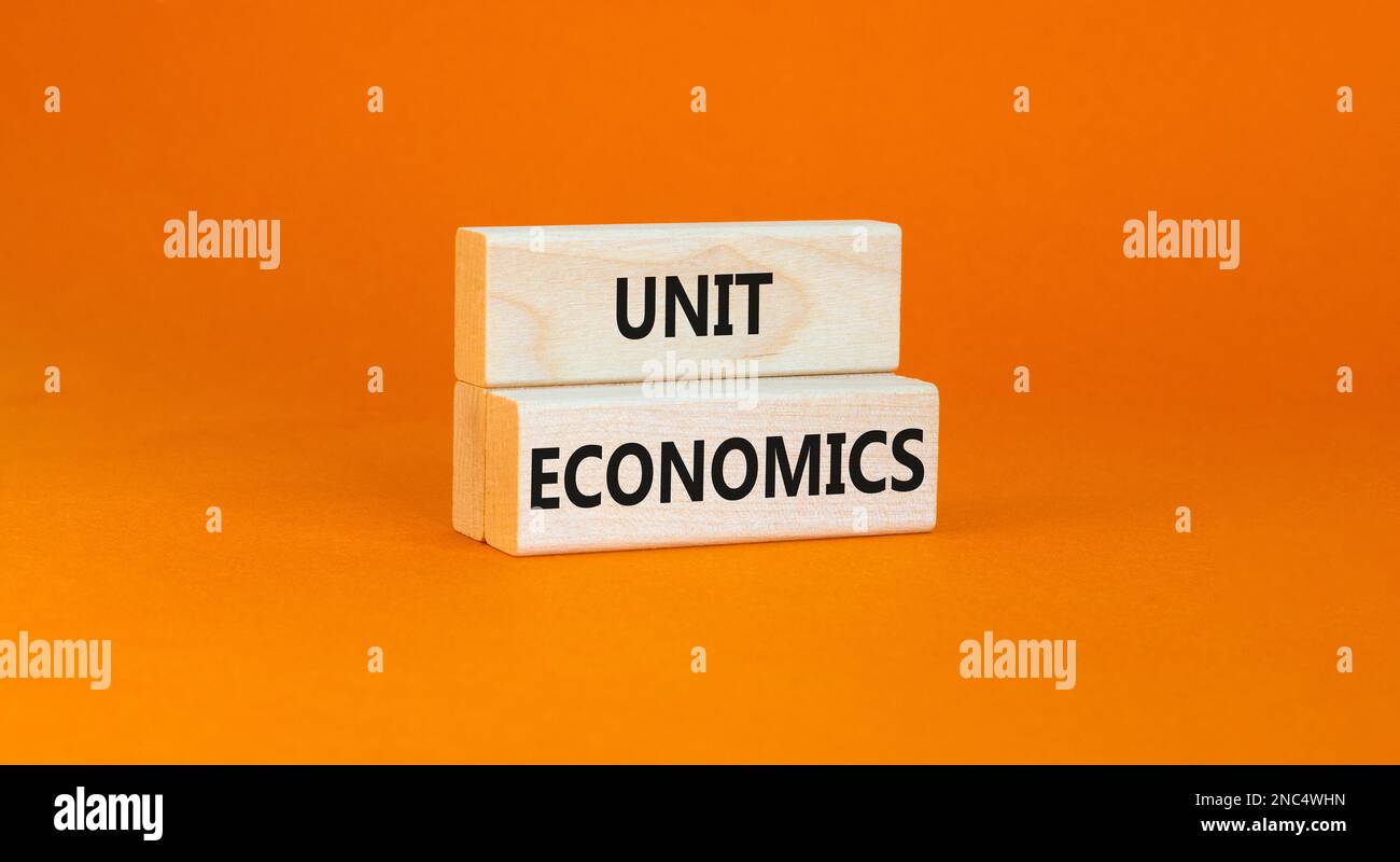 Unit economics symbol. Concept words Unit economics on wooden blocks ...