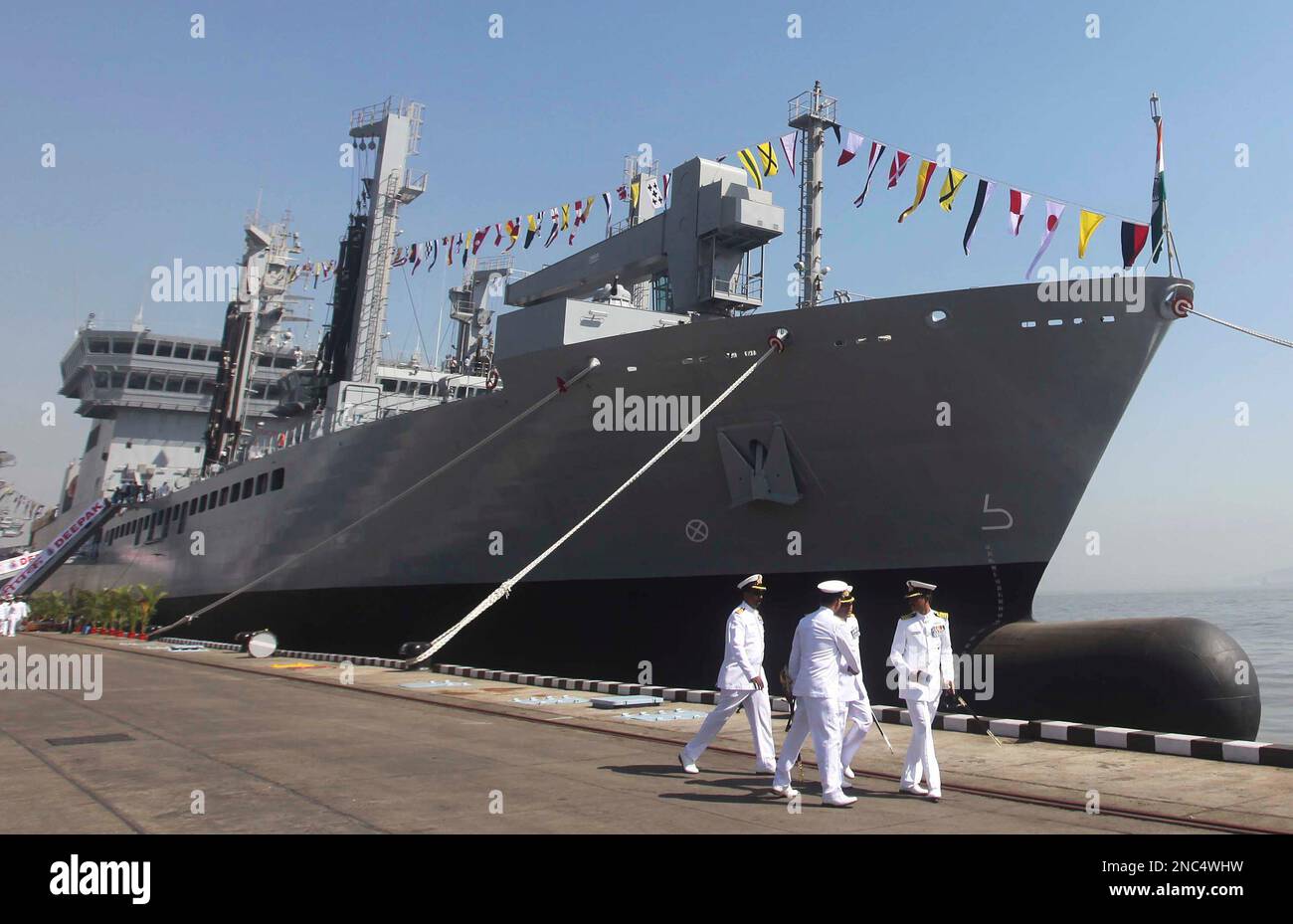 FILE- In this Jan. 21, 2011 file photo, Indian Naval officers walk past ...