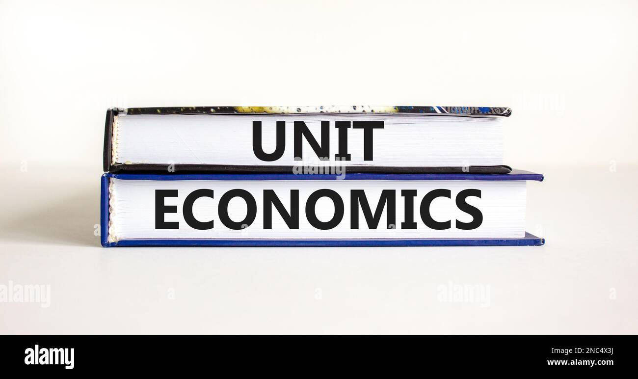 Unit economics symbol. Concept words Unit economics on books. Beautiful ...