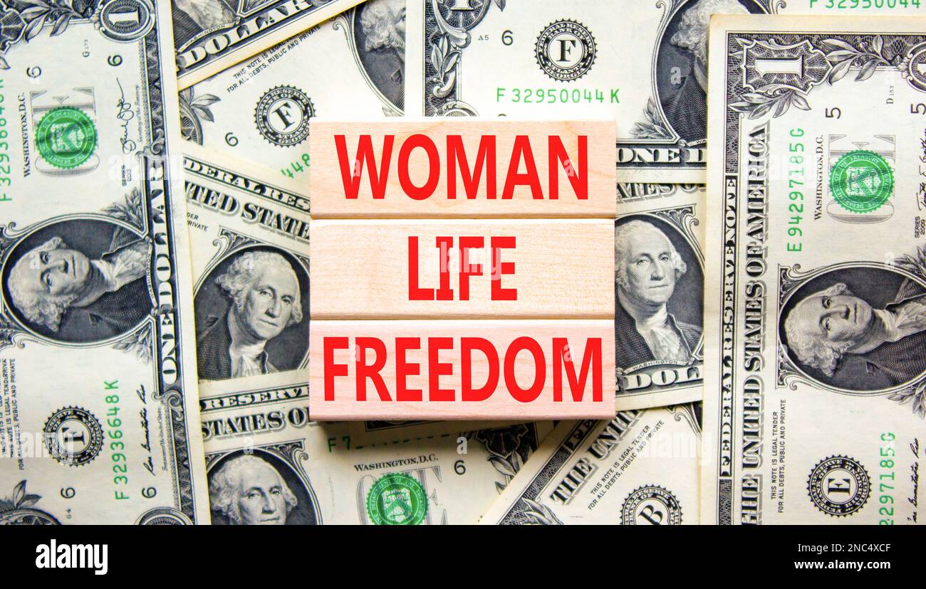 Woman life freedom symbol. Concept words Woman Life Freedom on wooden ...