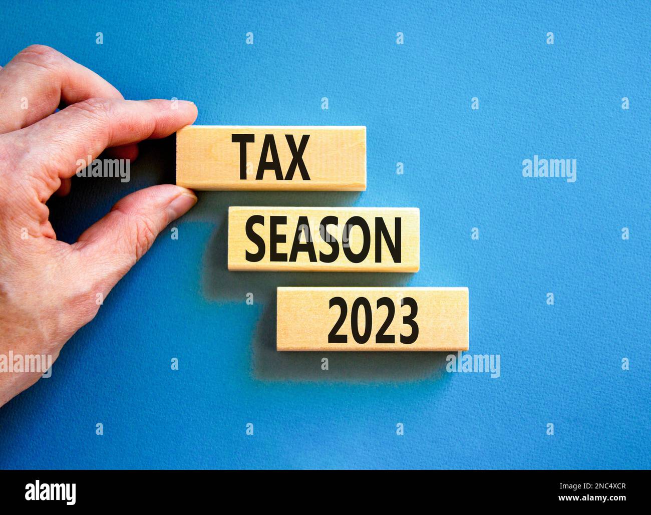 Tax season 2023 symbol. Concept words Tax season 2023 on wooden blocks ...