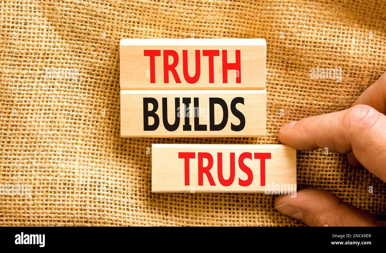 Truth builds trust symbol. Concept words Truth builds trust on wooden ...