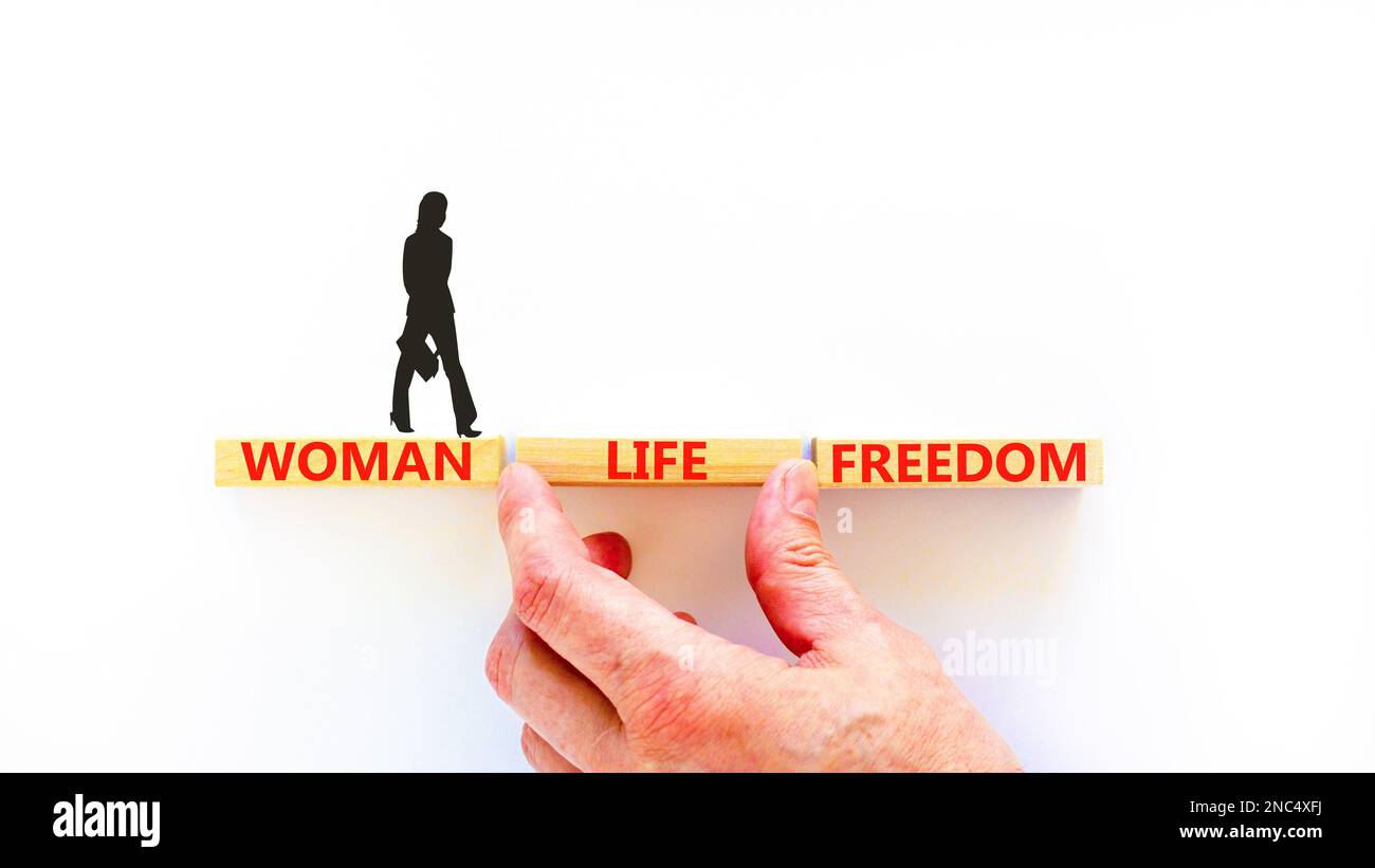 Woman life freedom symbol. Concept words Woman Life Freedom on wooden ...