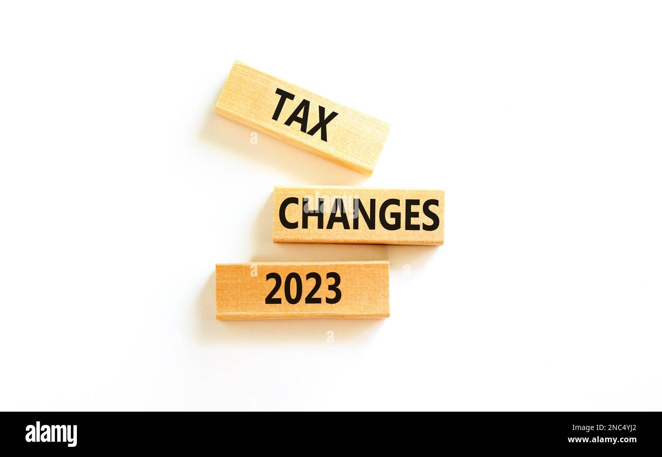 Tax changes 2023 symbol. Concept words Tax changes 2023 on wooden ...