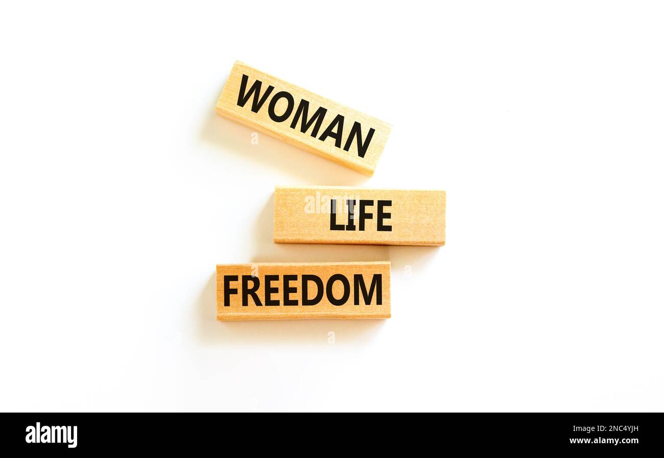 Woman life freedom symbol. Concept words Woman Life Freedom on wooden ...