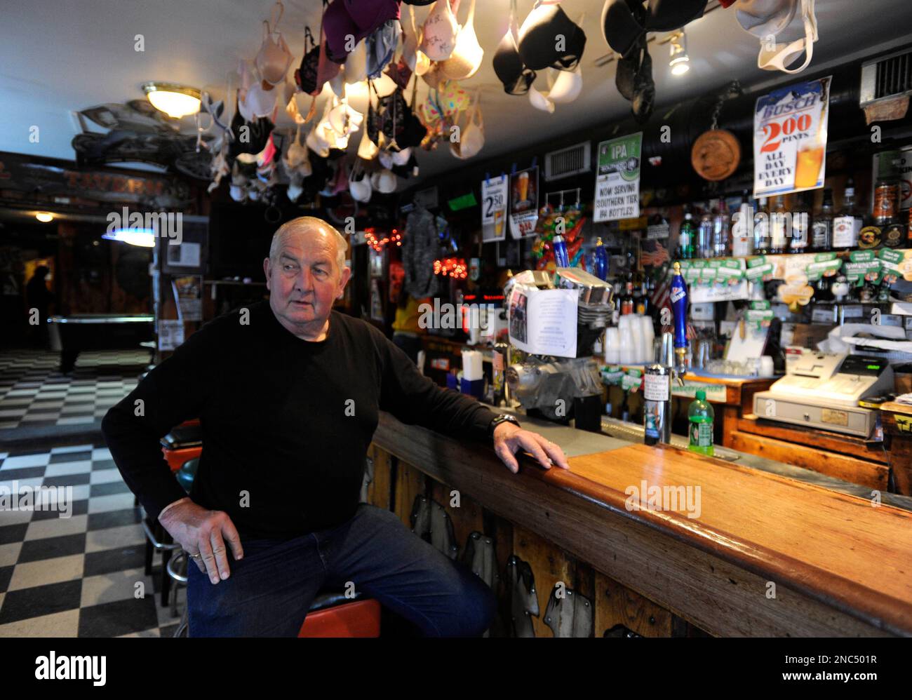 In a March 10, 2011 photo, Don Birch sits at the bar in his Sawmill ...