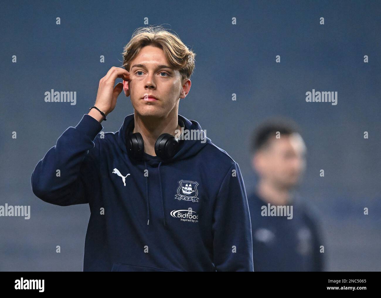 Plymouth Argyle midfielder Callum Wright (26) walks on and inspect the ...