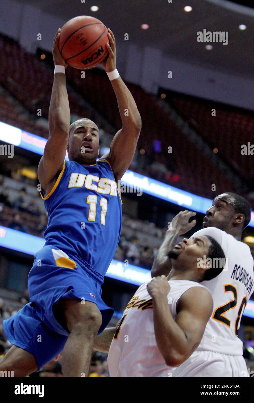 UC Santa Barbara guard Justin Joyner (11) takes off for the basket ...