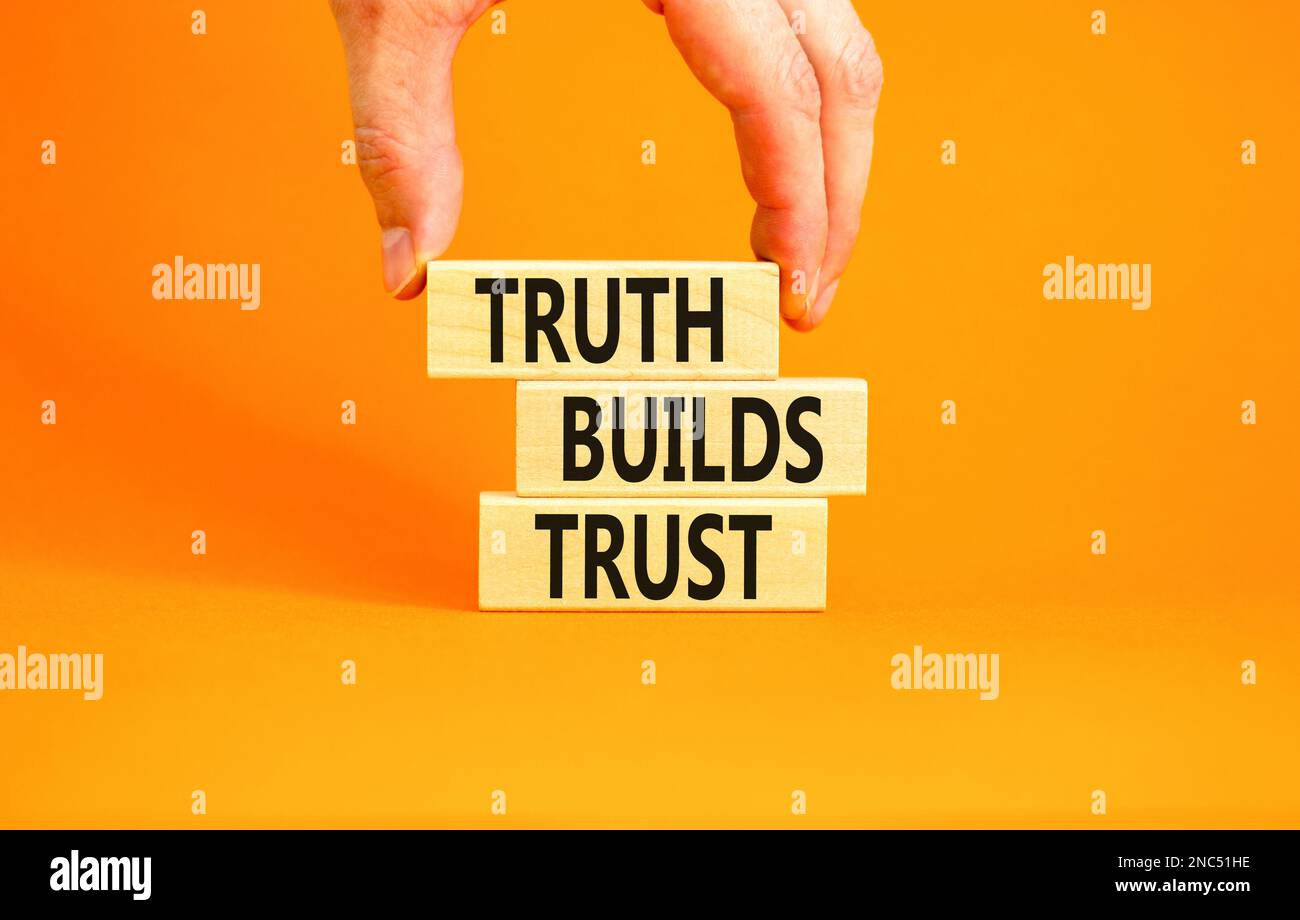 Truth builds trust symbol. Concept words Truth builds trust on wooden ...