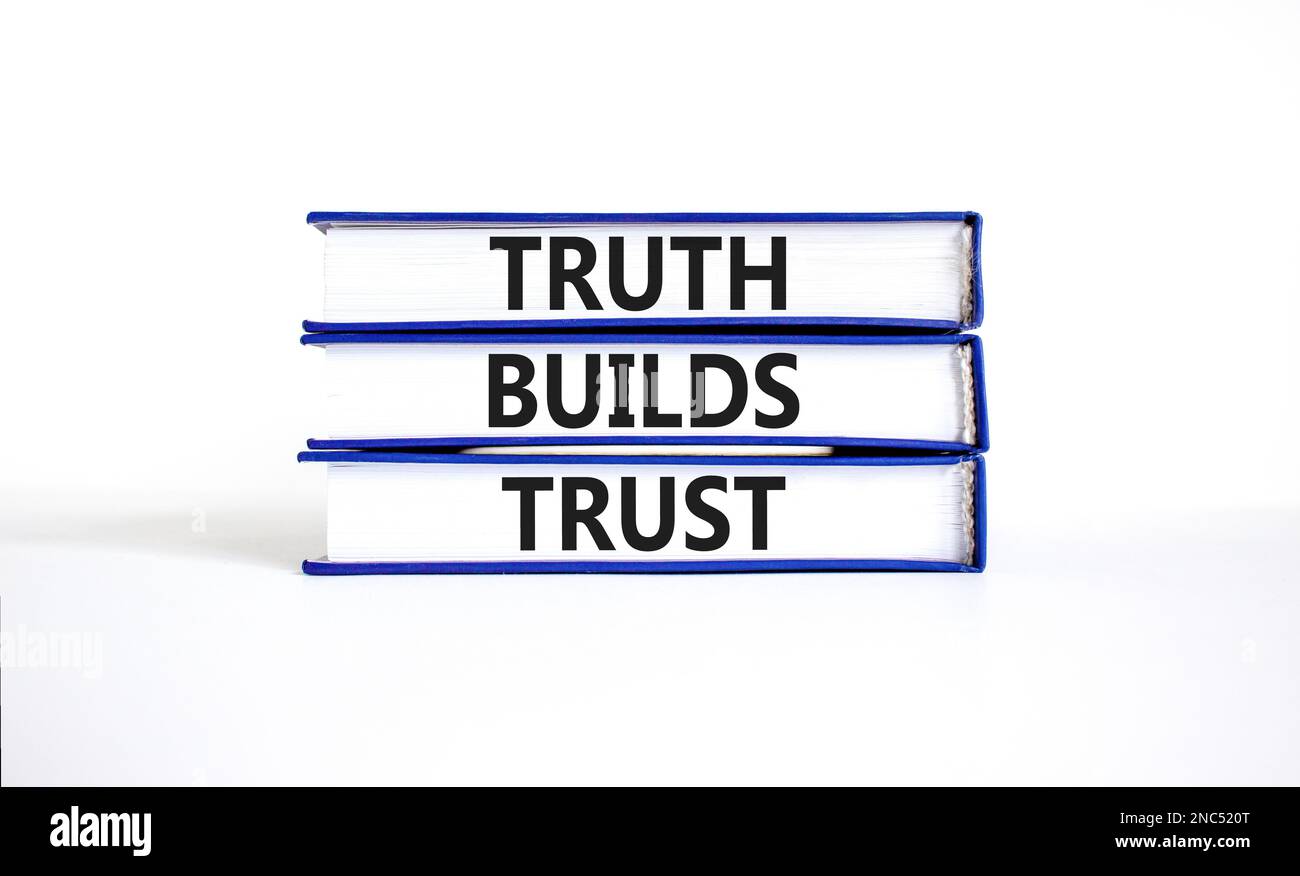 Truth builds trust symbol. Concept words Truth builds trust on books on ...