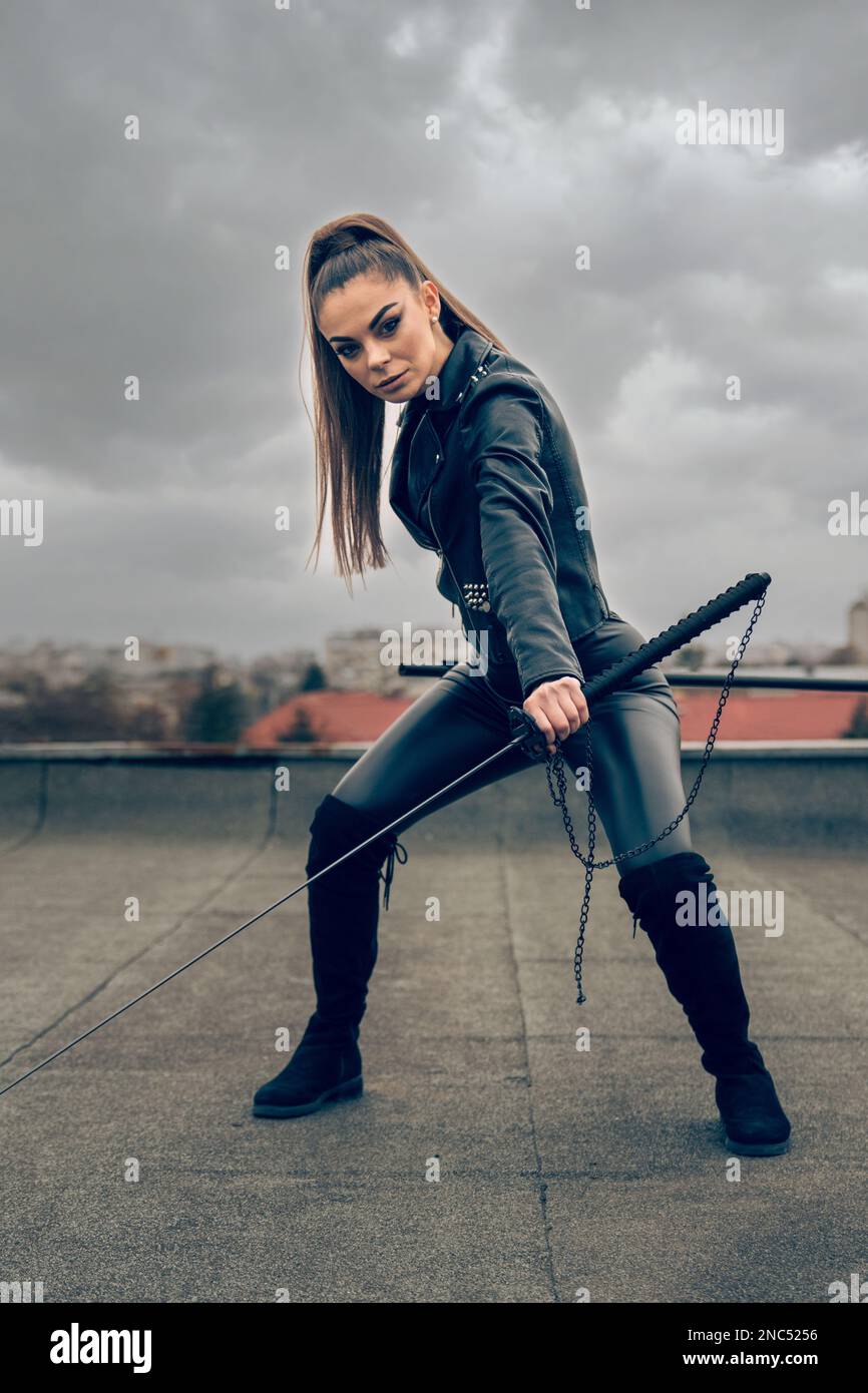 Female assassin leather hi-res stock photography and images - Alamy