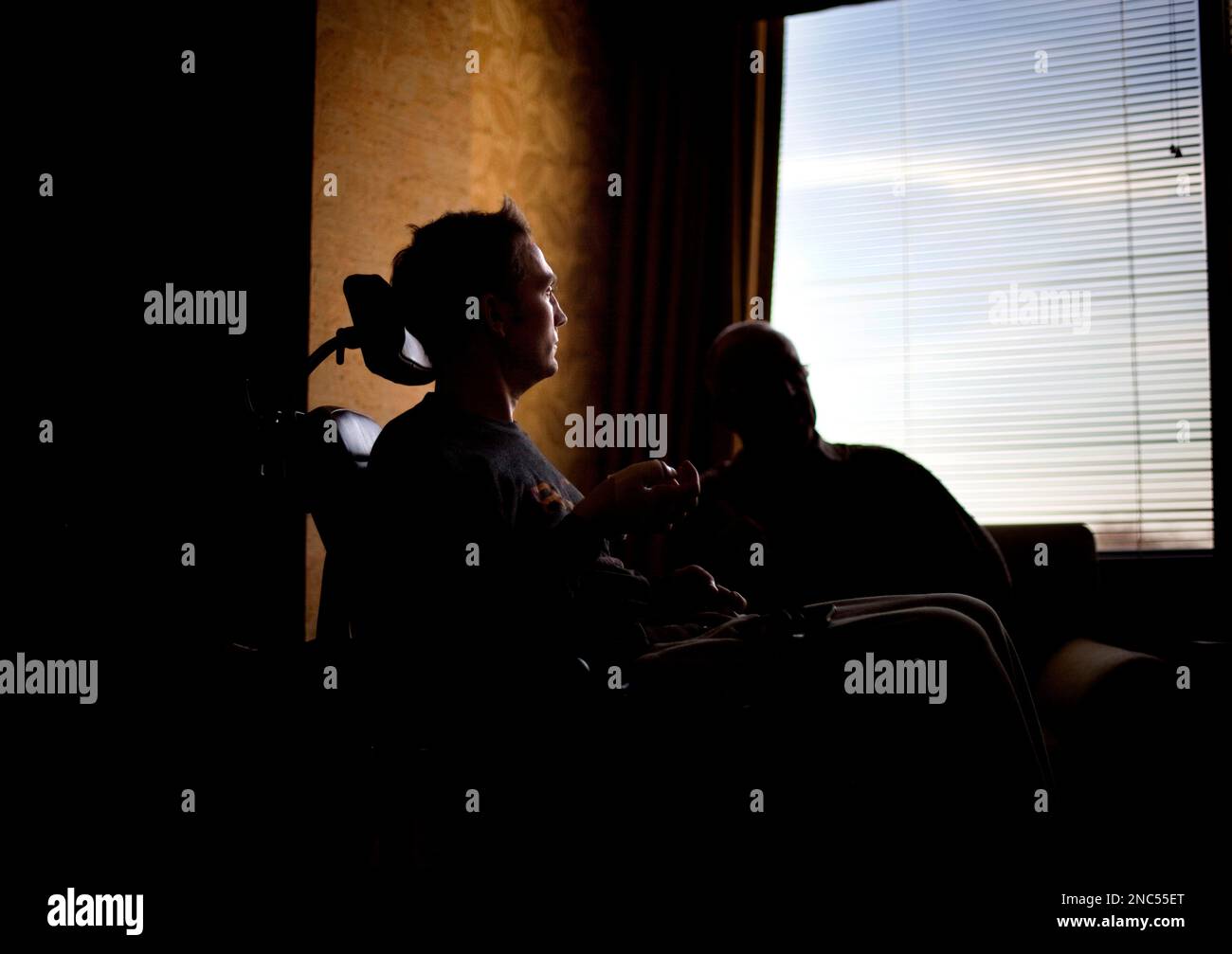 In this March 2, 2011 photo, former race car driver, Shane Hmiel, left ...