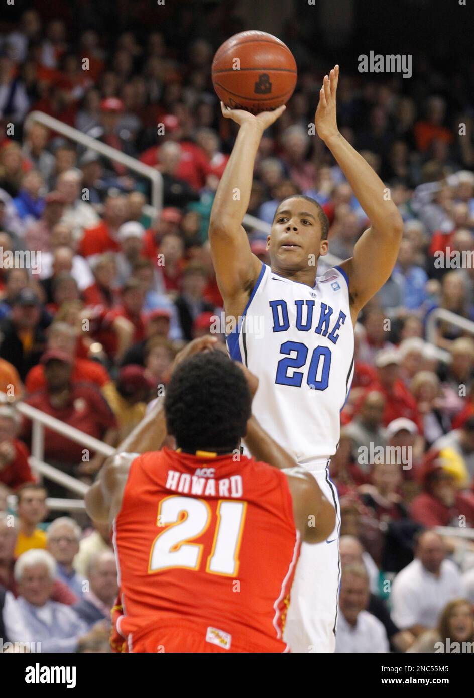 Duke's Andre Dawkins (20) shoots over Maryland's Pe'Shon Howard (21) in ...