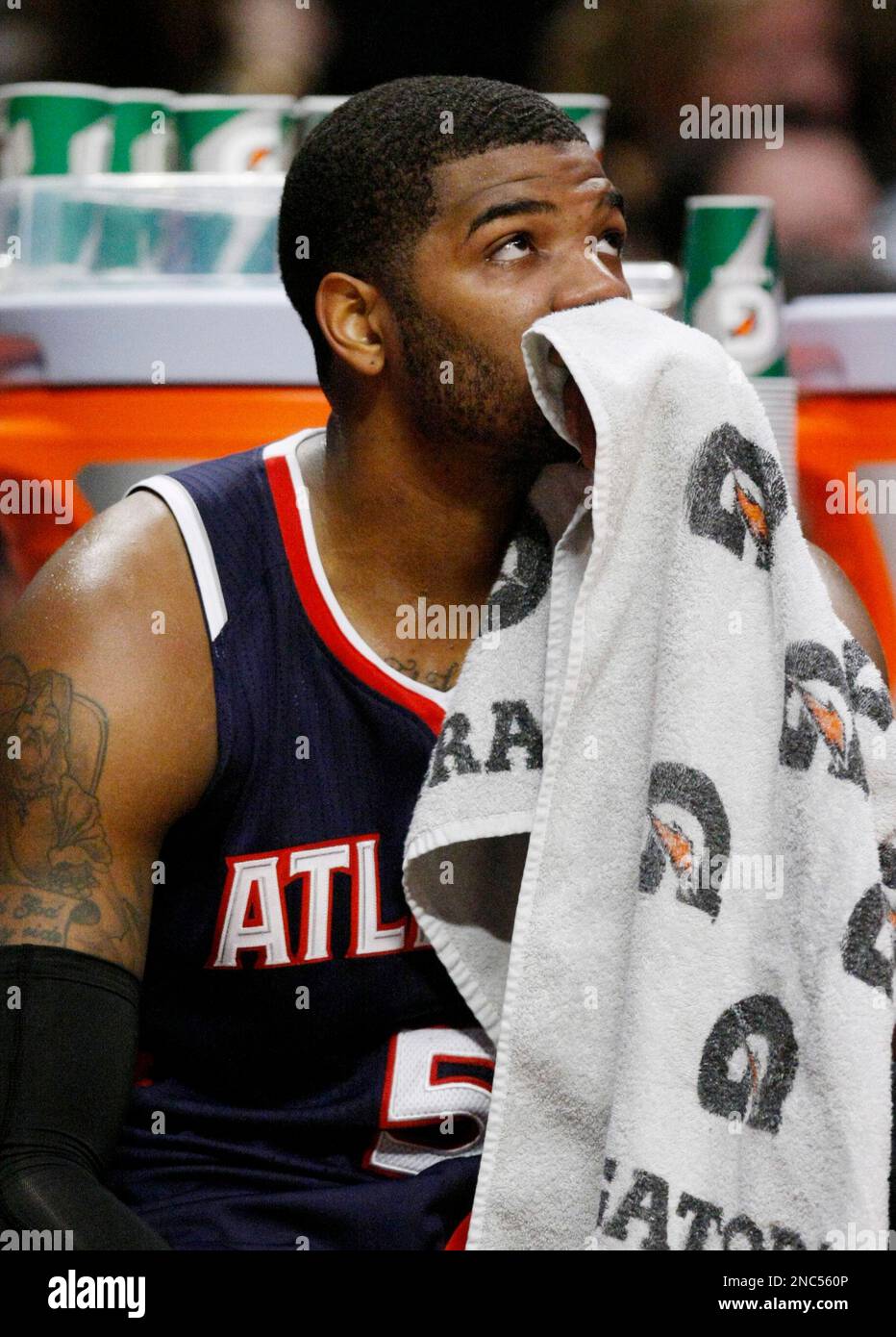 Atlanta Hawks power forward Josh Smith looks up at the scoreboard ...