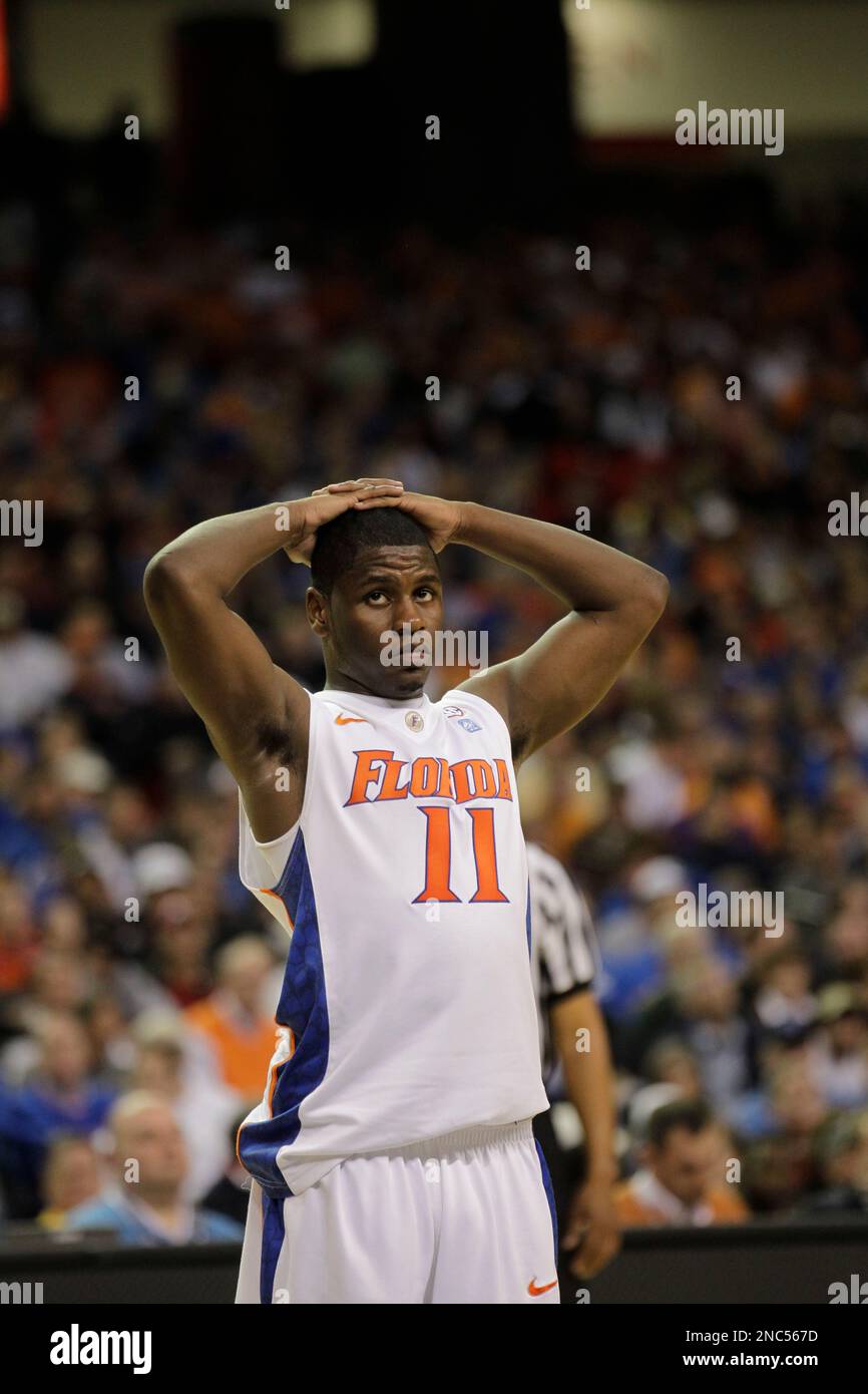 Florida guard Erving Walker (11) walks off the court during the second ...