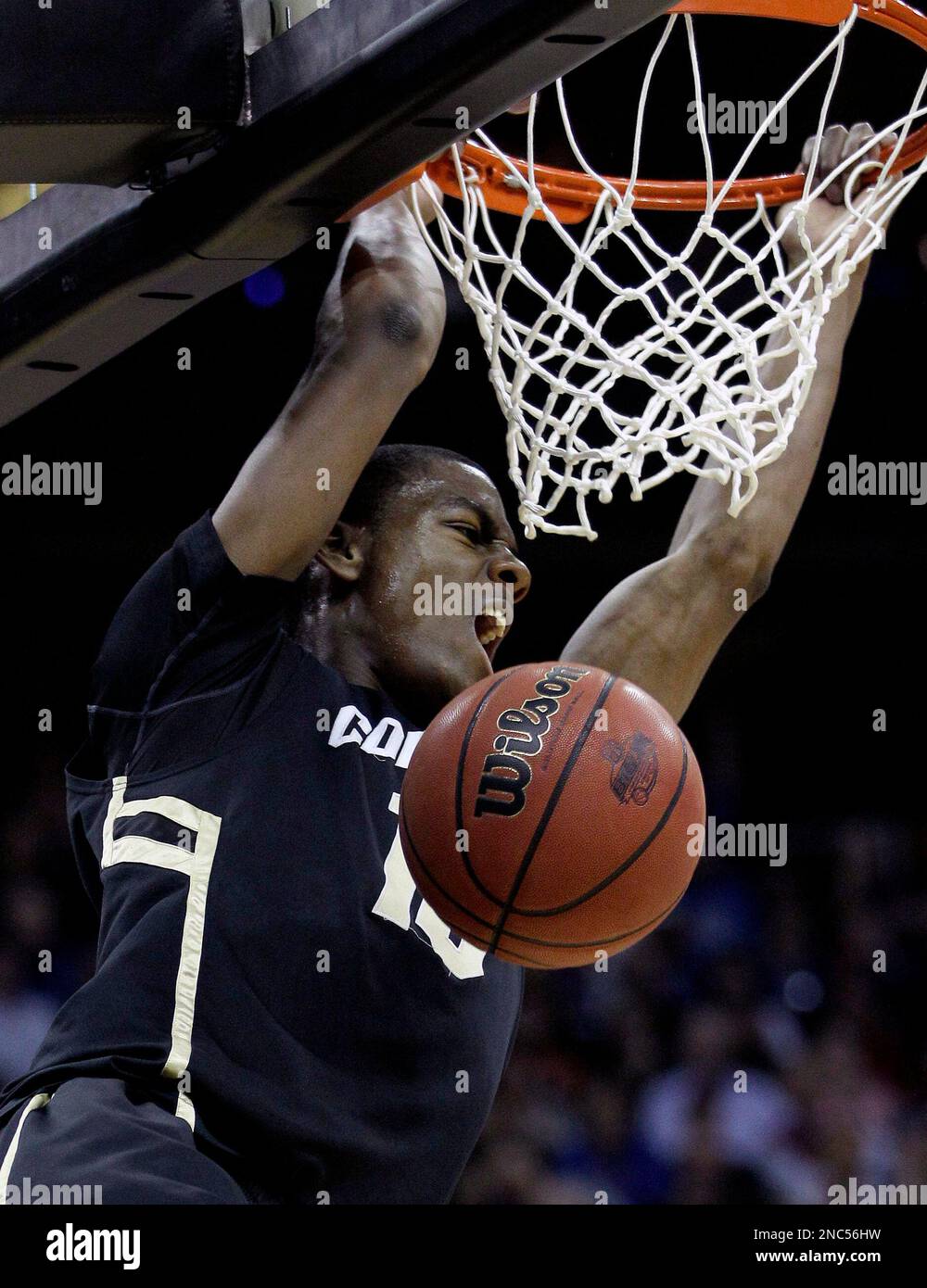 Colorado guard Alec Burks (10) dunks the ball during the first half of ...