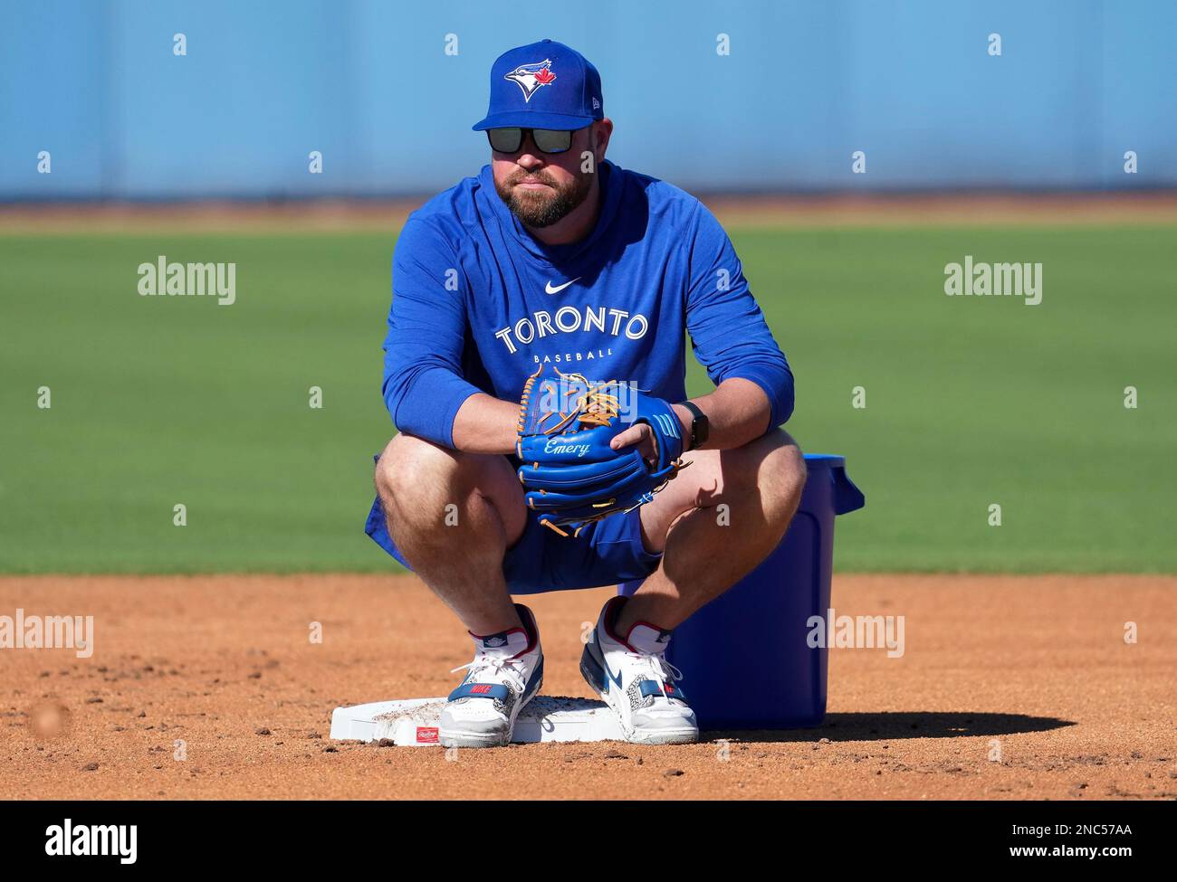 Toronto Blue Jays manager John Schneider watches a drill from second ...