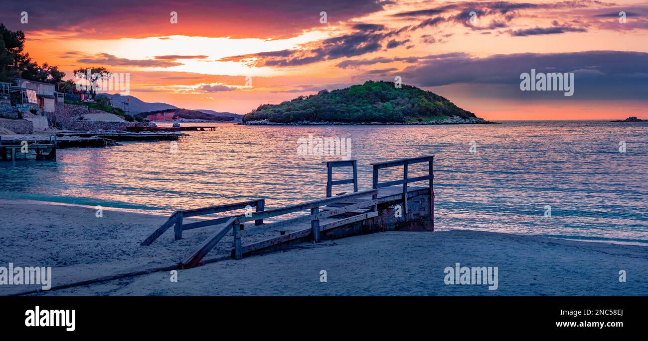 Panoramic spring sunset in Ksamil town. Unbelievable evening seascape ...