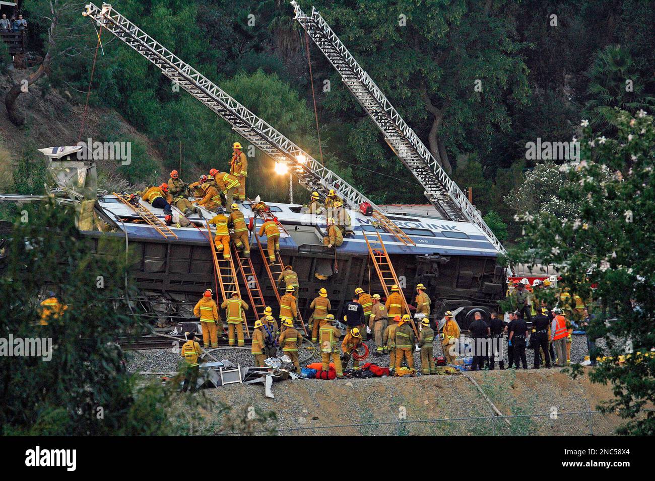 FILE - In this Sept. 12, 2008 file photo, firefighters work to rescue ...