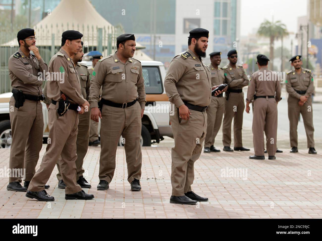 Saudi policemen form a check point near the site where a demonstration ...