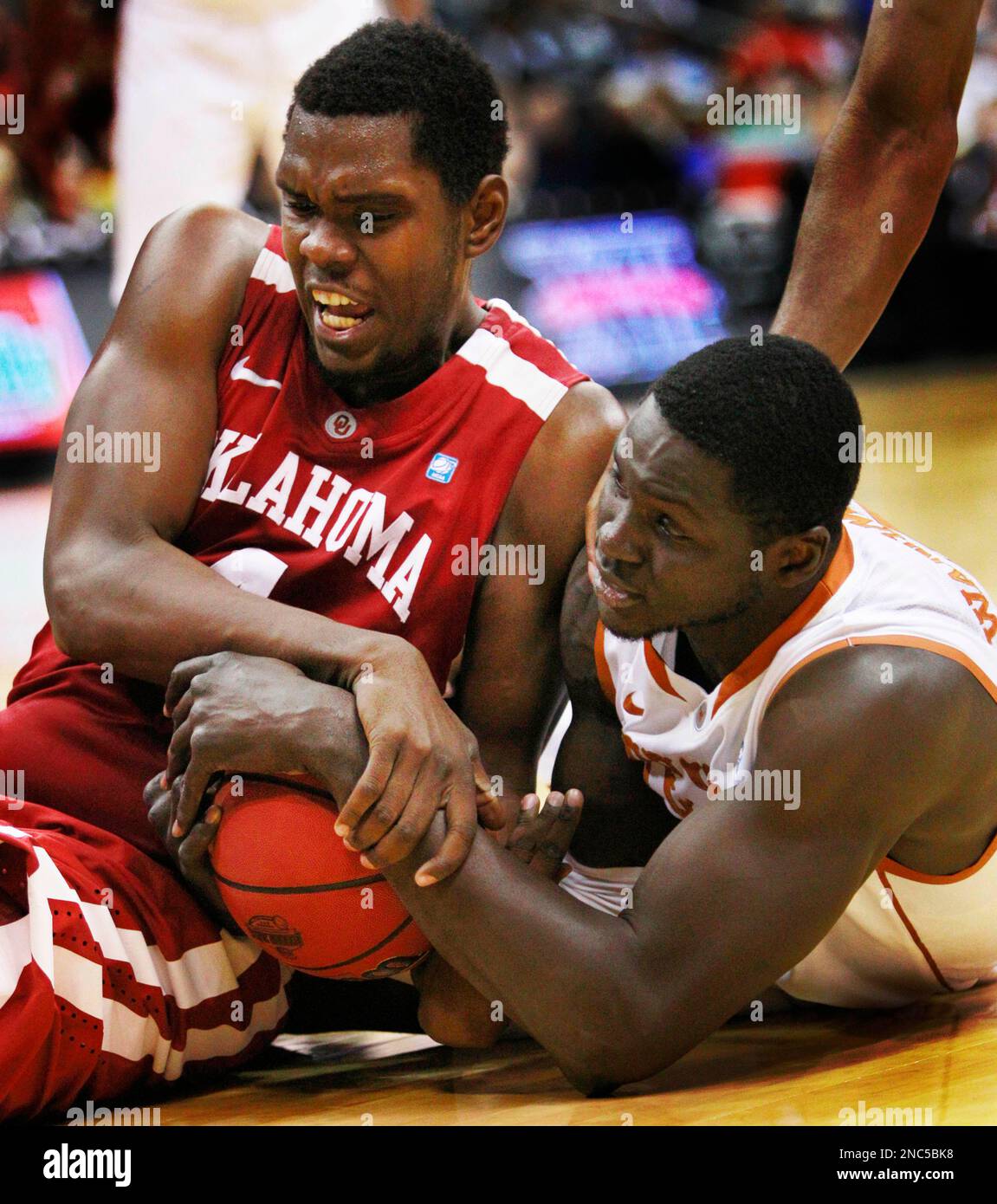 Oklahoma forward Andrew Fitzgerald, left, and Texas forward Alexis ...