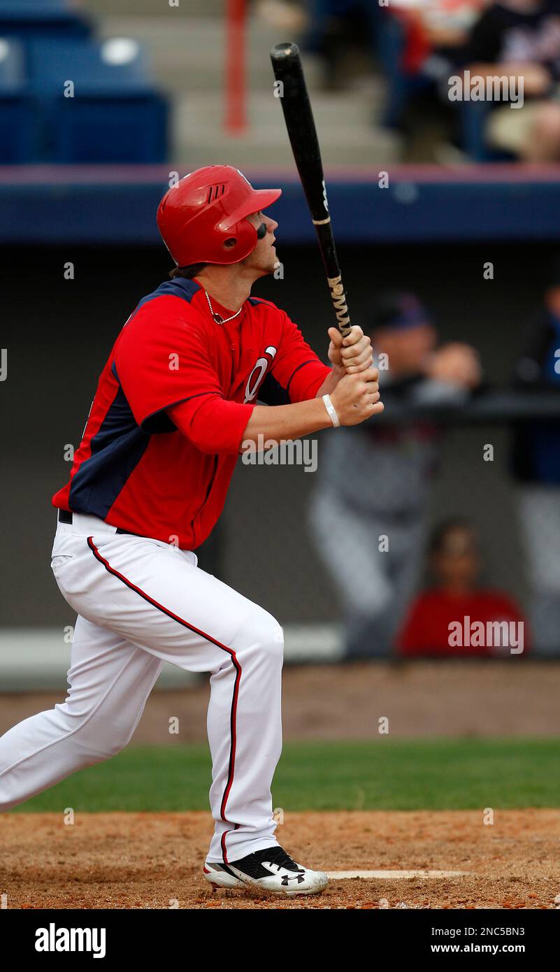 Washington Nationals right fielder Bryce Harper bats during a spring ...