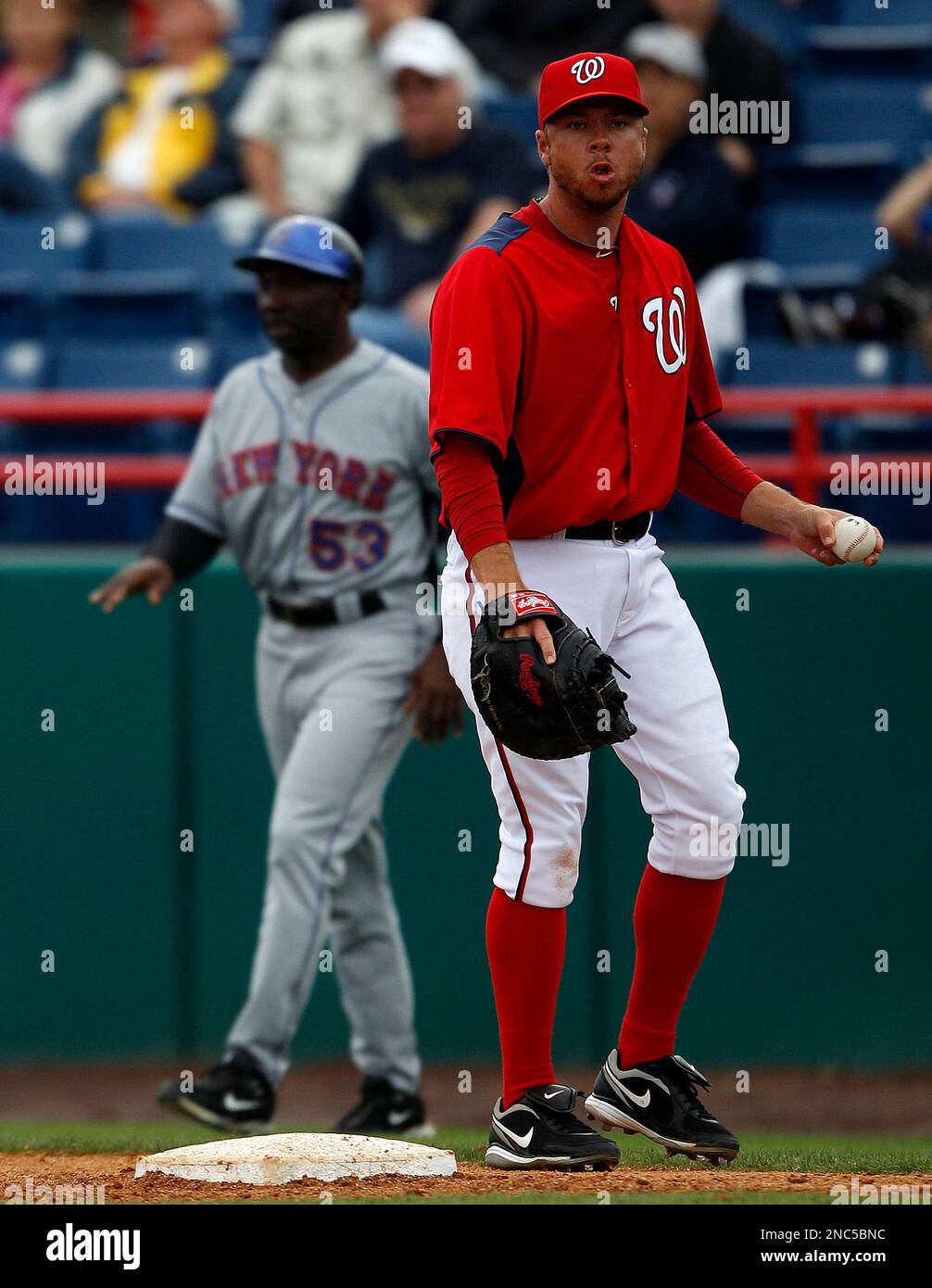 Washington Nationals first baseman Michael Aubrey (10) fields a ball ...