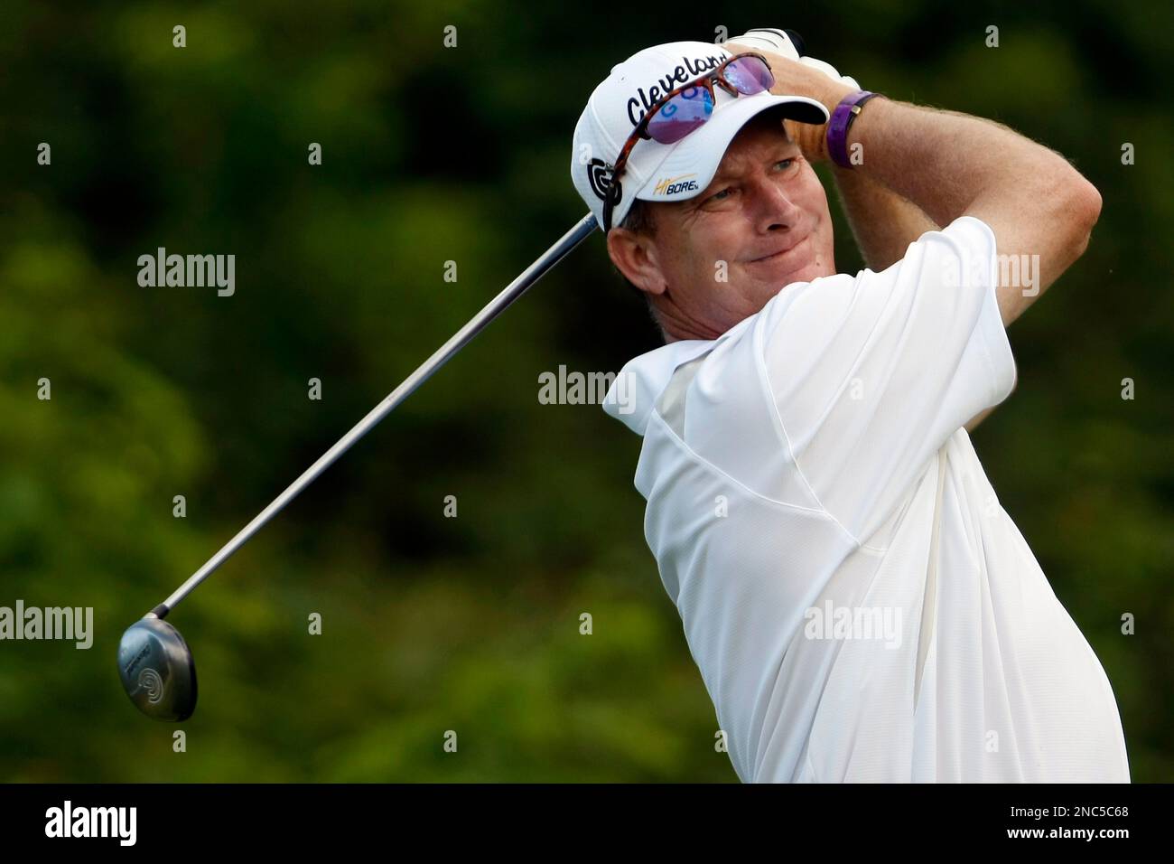 US' Woody Austin watches his shot from the sixth tee during the first ...