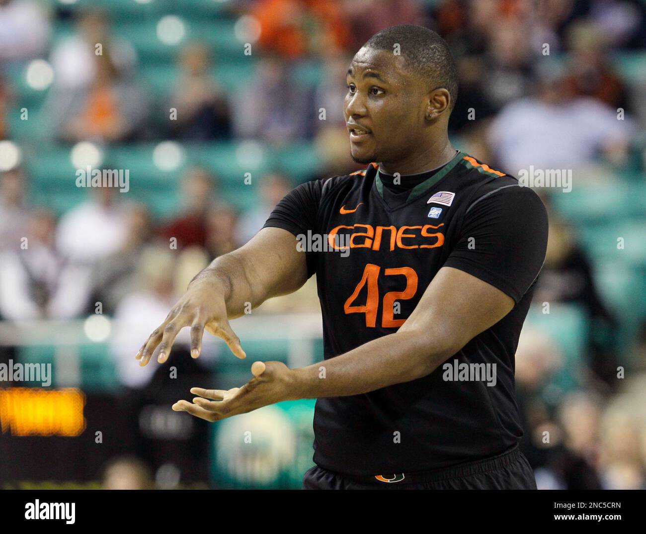 Miami's Reggie Johnson (42) reacts in the second half of an NCAA ...