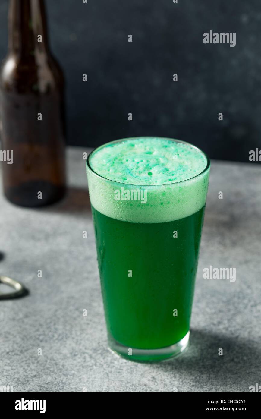 Boozy Green St Patricks Day Beer in a Pint Glass Stock Photo - Alamy
