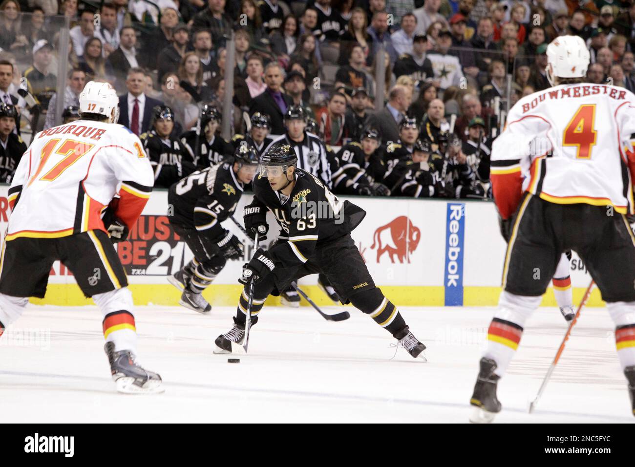 Calgary Flames' Rene Bourque (17), Jay Bouwmeester (4) and Dallas Stars ...