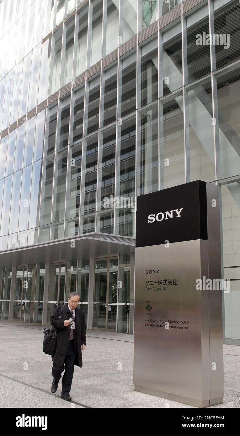 A man leaves the headquarters of Sony Corp. in Tokyo Thursday, March 10 ...