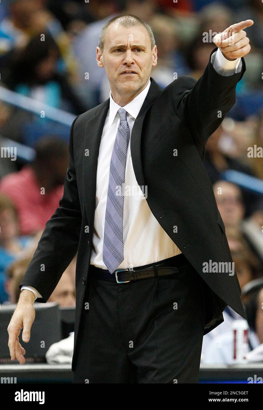 Dallas Mavericks coach Rick Carlisle directs his players in the second ...