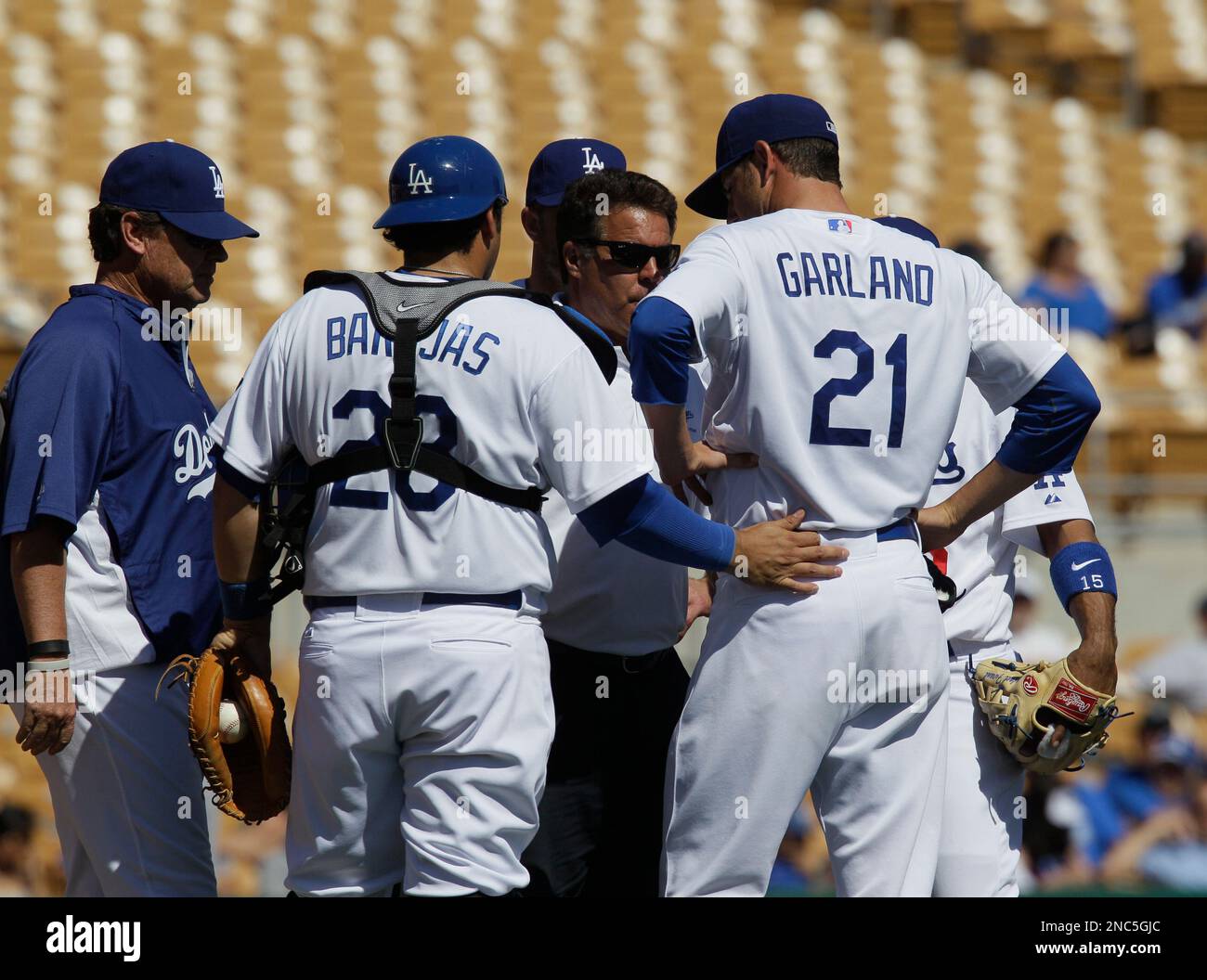 Los Angeles Dodgers starting pitcher Jon Garland(21) reacts as he talks ...