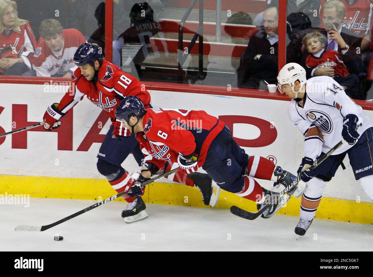 Washington Capitals' Marco Sturm (18) of Germany and Dennis Wideman (6 ...