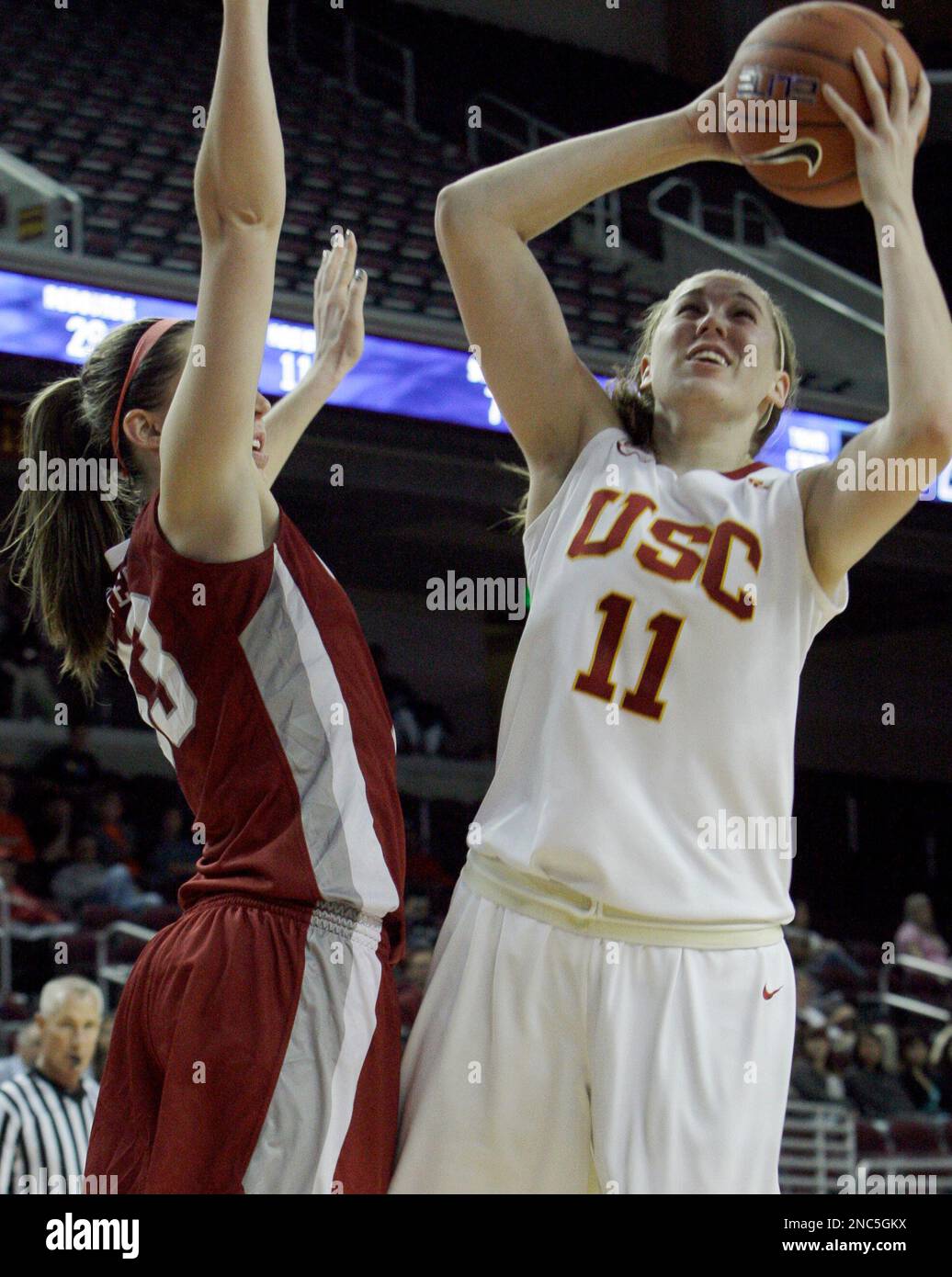 Southern California forward Cassie Harberts (11) shoots over Washington ...