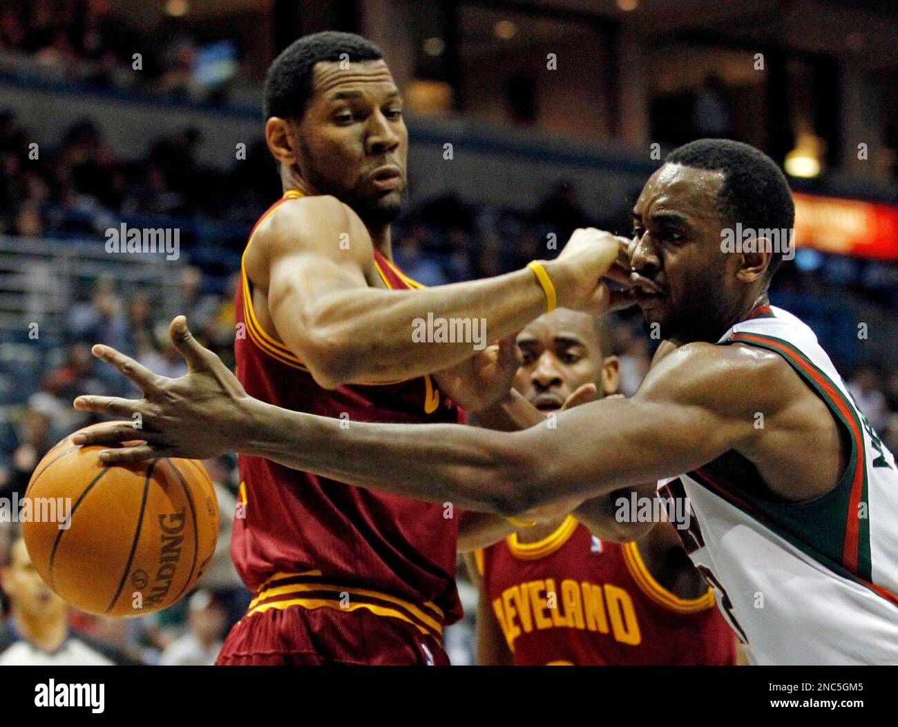 Milwaukee Bucks' Luc Richard Mbah a Moute, right, and Cleveland ...