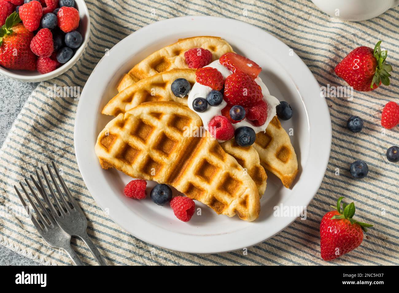 Homemade Croissant Waffle Croffles with Berries and Cream Stock Photo ...