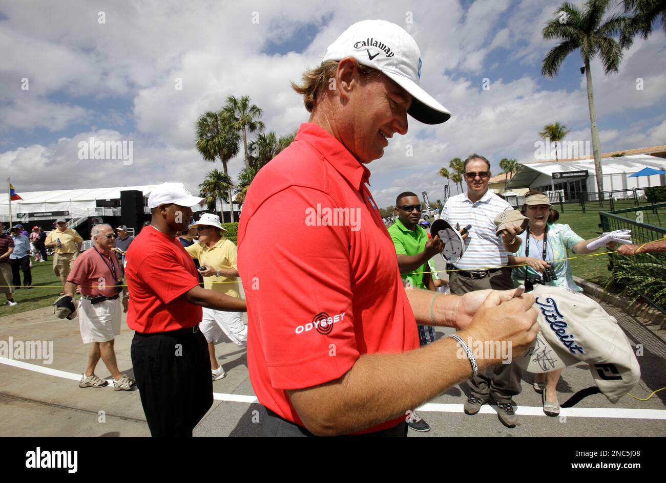 Ernie Els of South Africa signs autographs during a practice round at ...