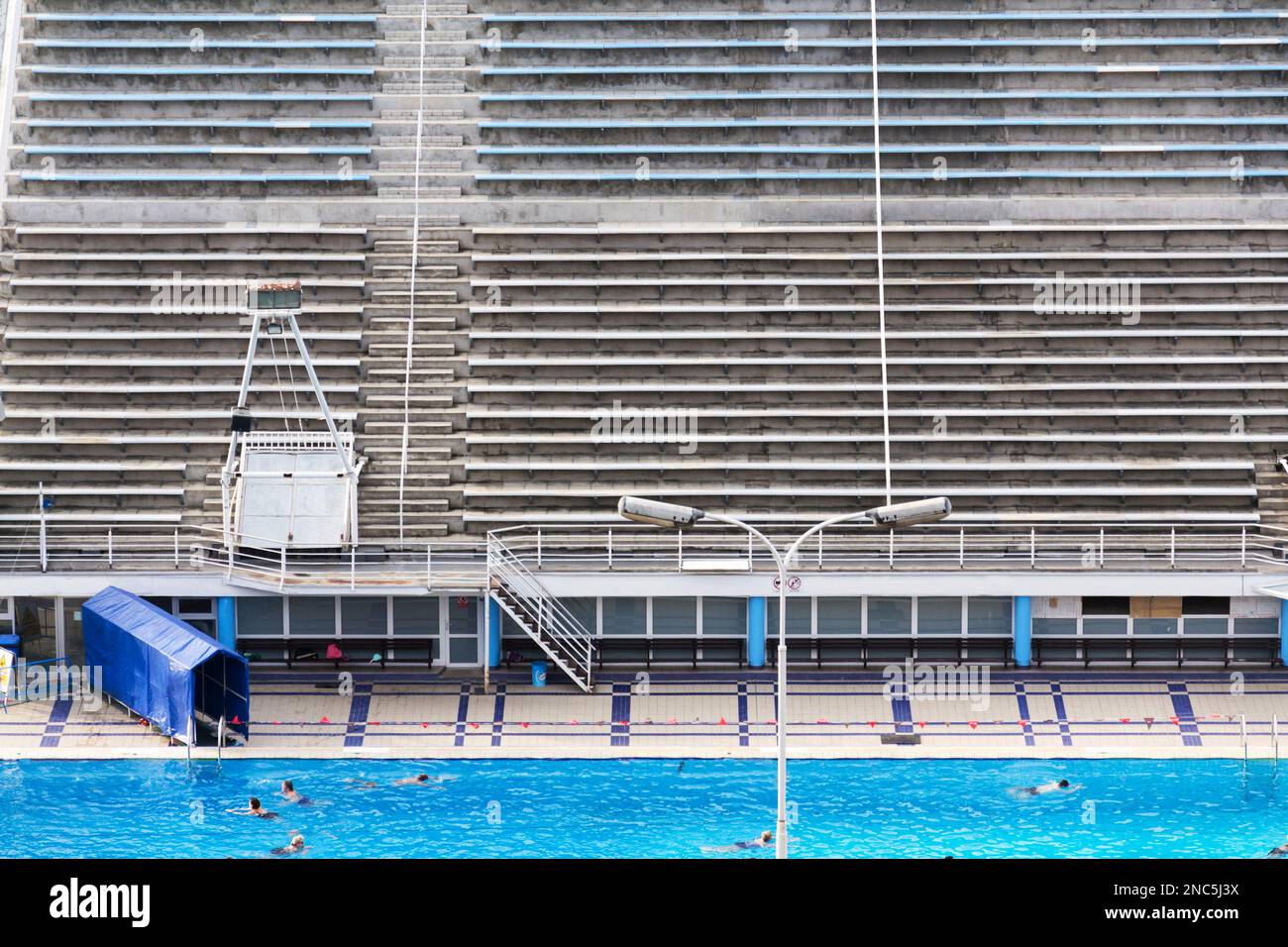 The empty stands of a large sports pool equipped with modern equipment ...