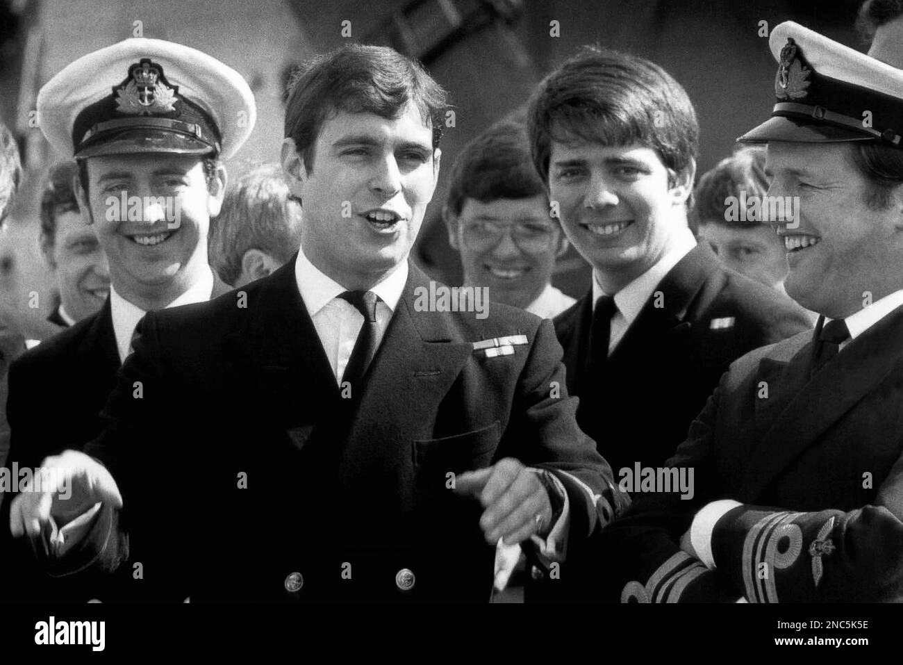 Prince Andrew a helicopter pilot aboard the HMS Invincible jokes with ...