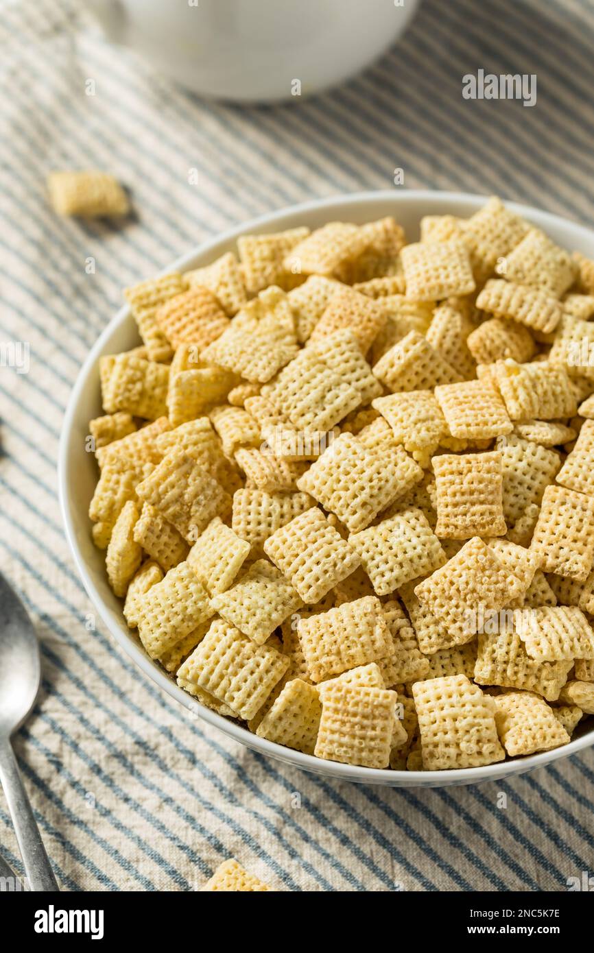 Homemade Puffed Square Rice Cereal for Breakfast in a Bowl Stock Photo ...